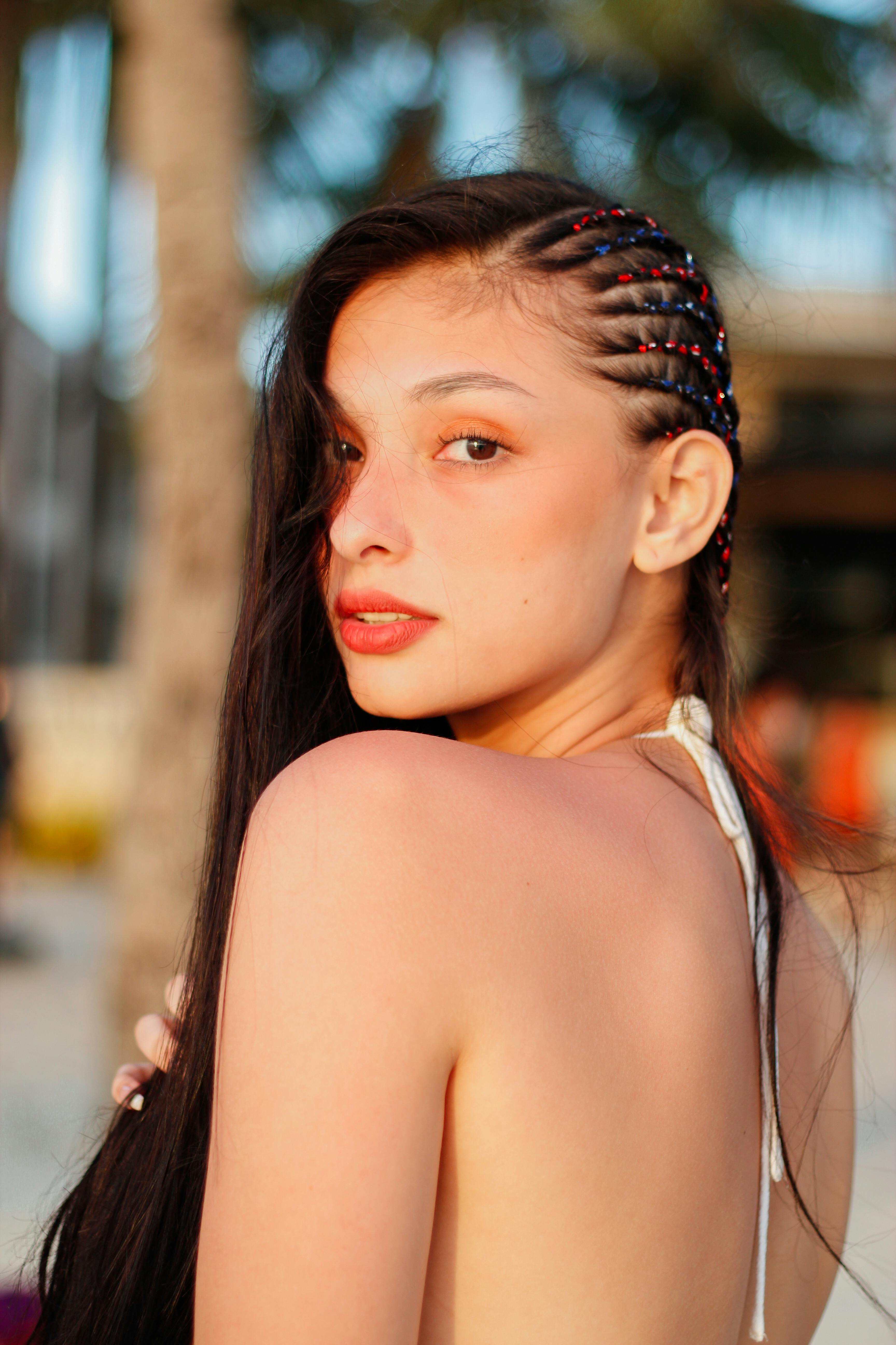A Woman in White Backless Top · Free Stock Photo