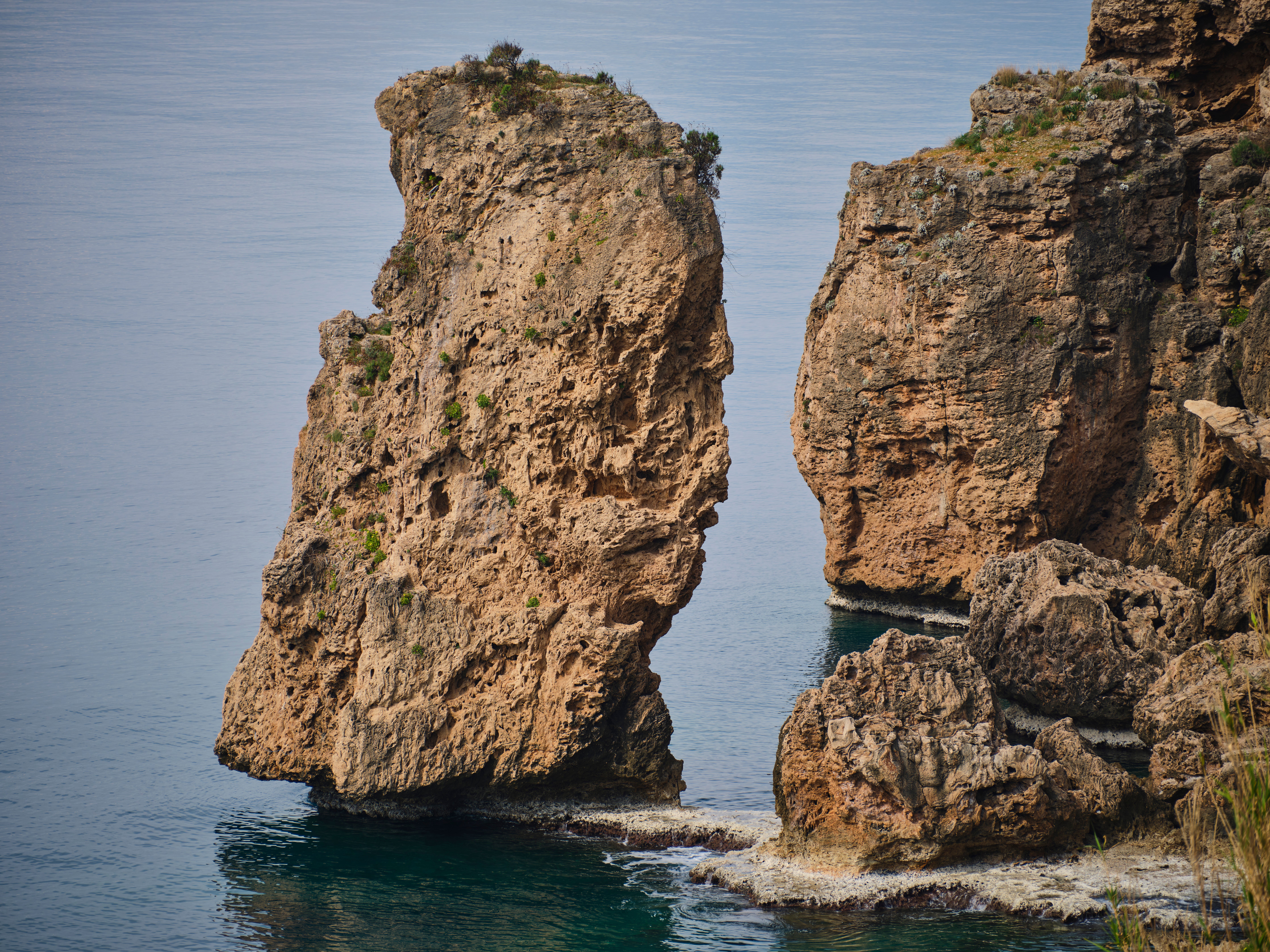 Rock Formation in Body of Water · Free Stock Photo