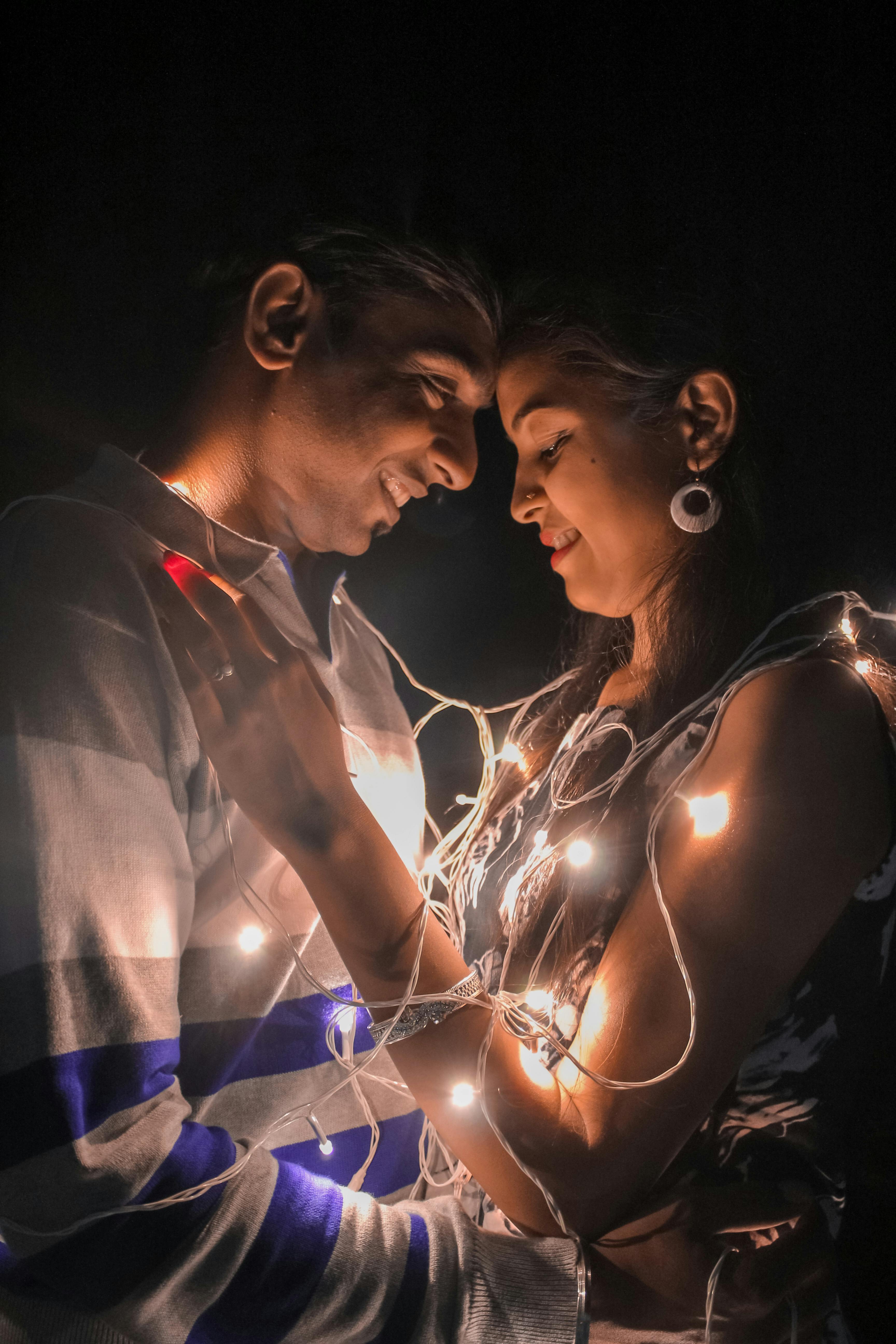 Couple Facing Each Other · Free Stock Photo