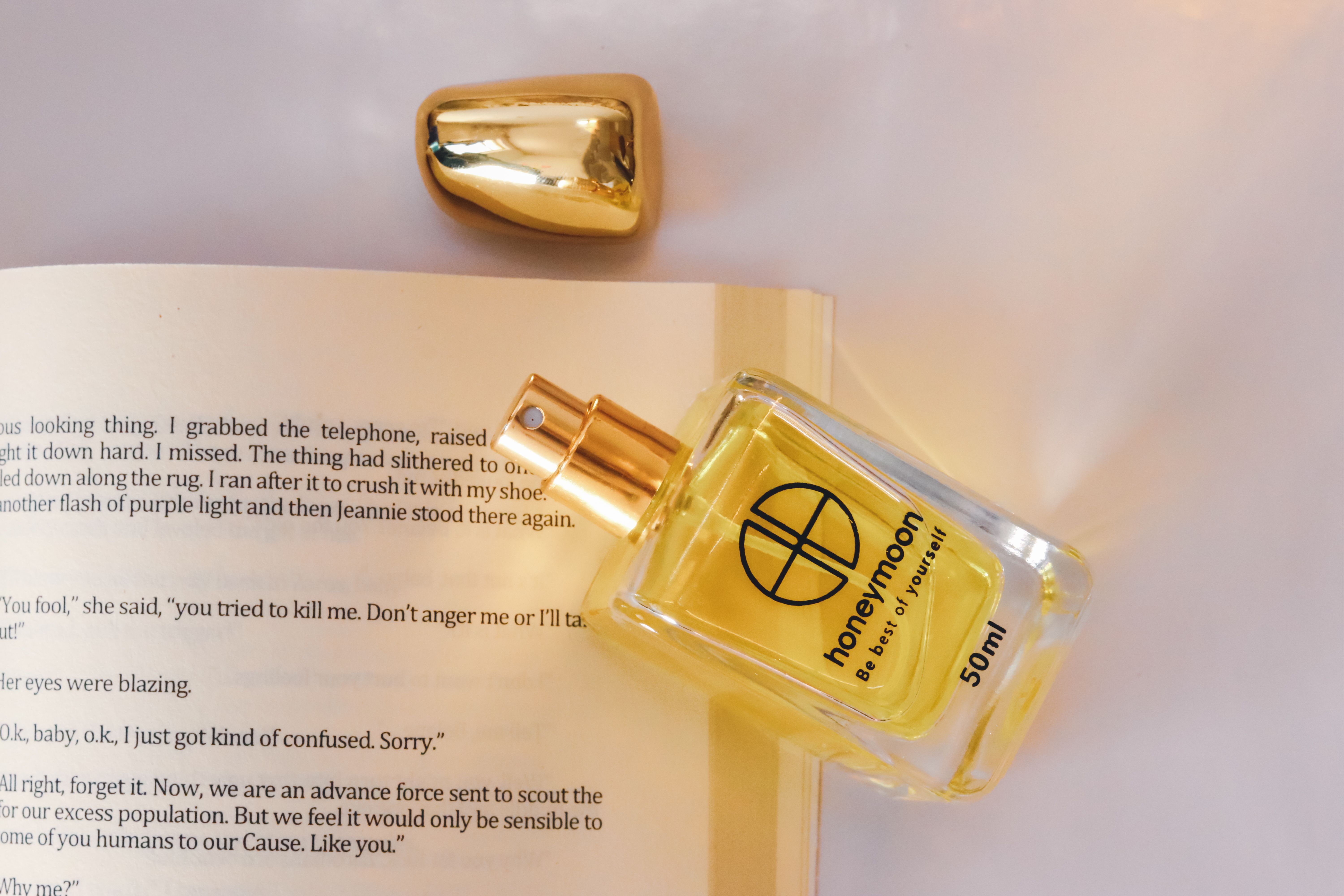 Close-Up of a Bottle of Perfume · Free Stock Photo