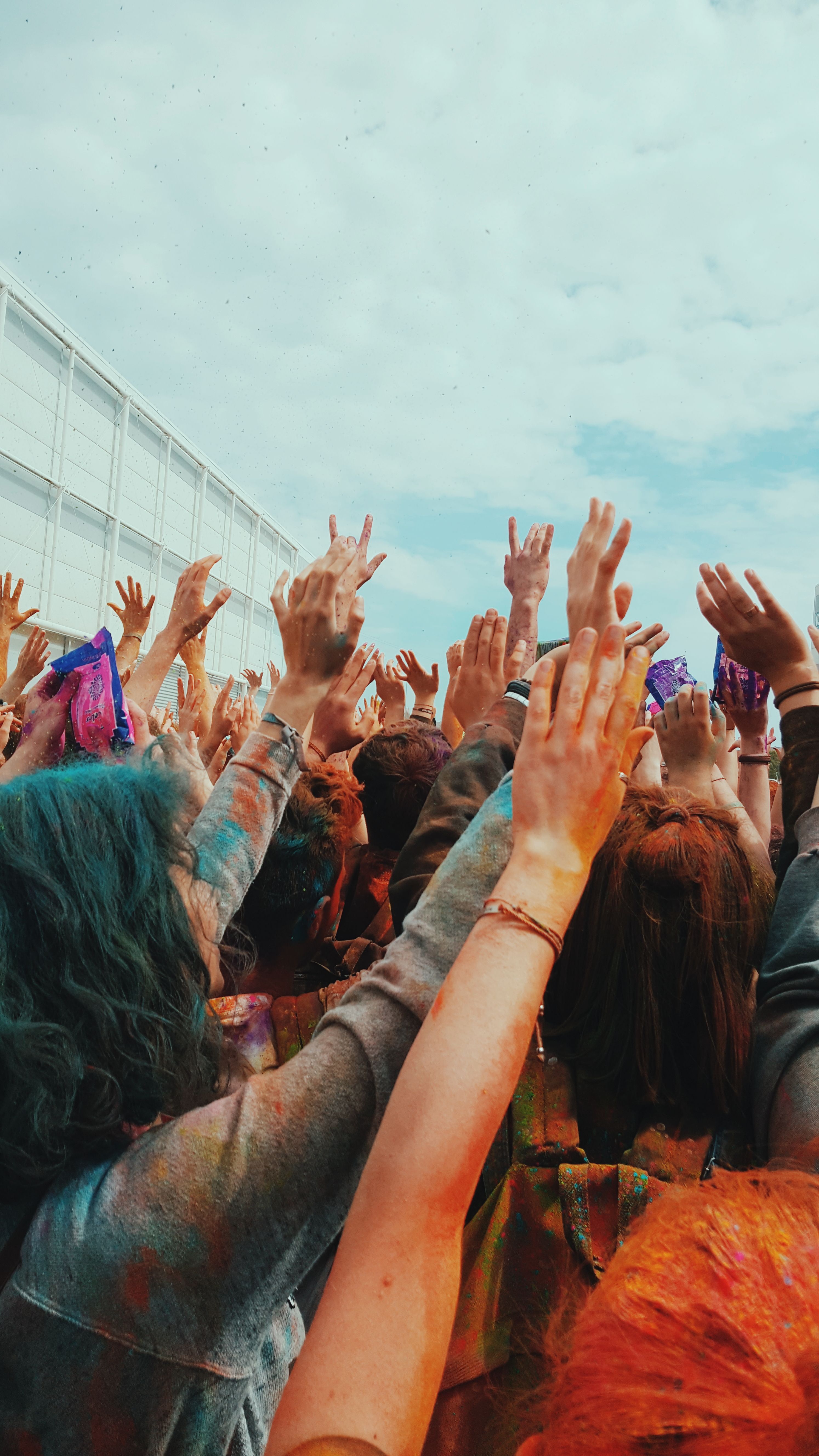 People Raising their Hands in a Festival · Free Stock Photo