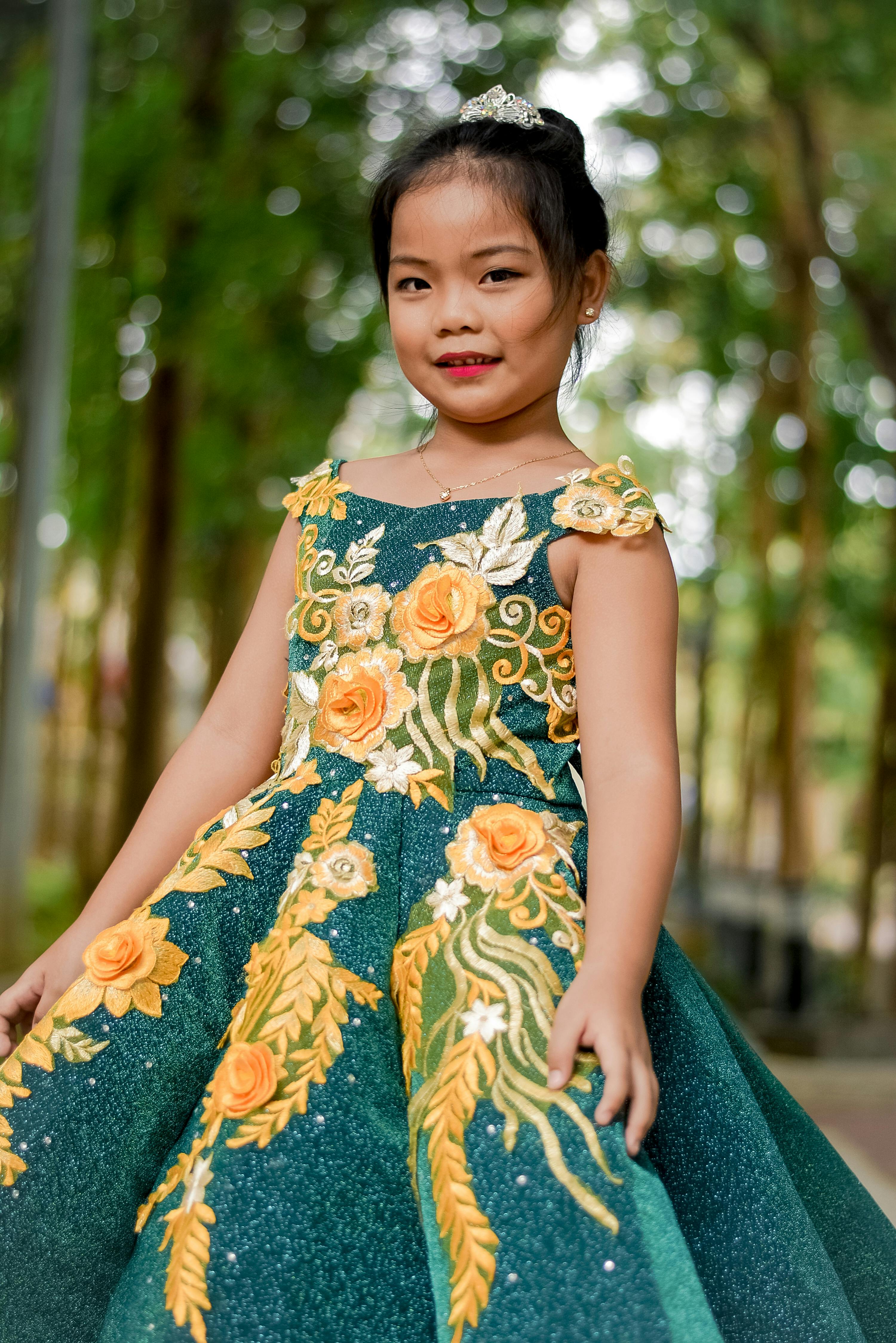 Girl in Floral Dress · Free Stock Photo