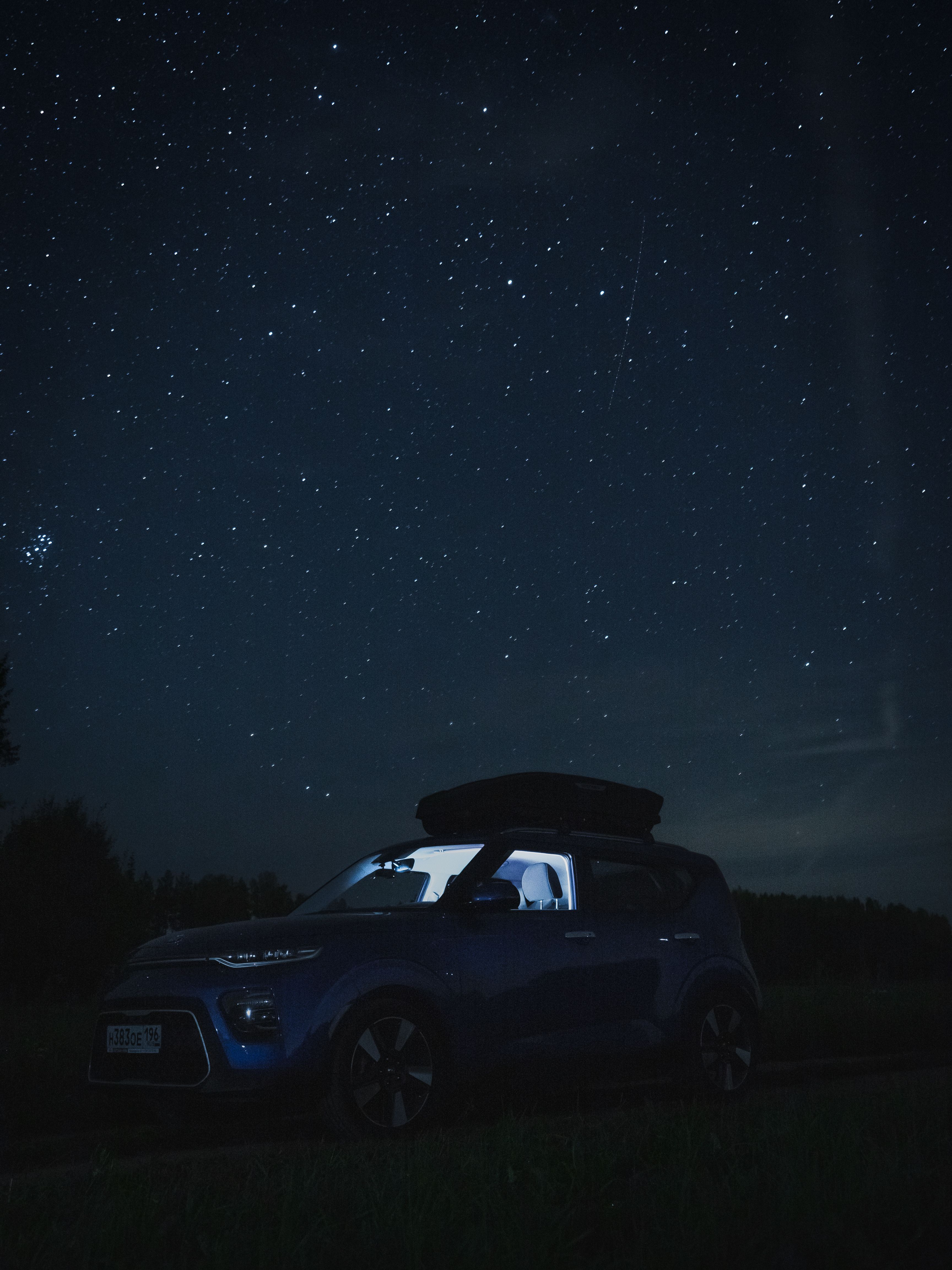 Car Under a Starry Sky · Free Stock Photo