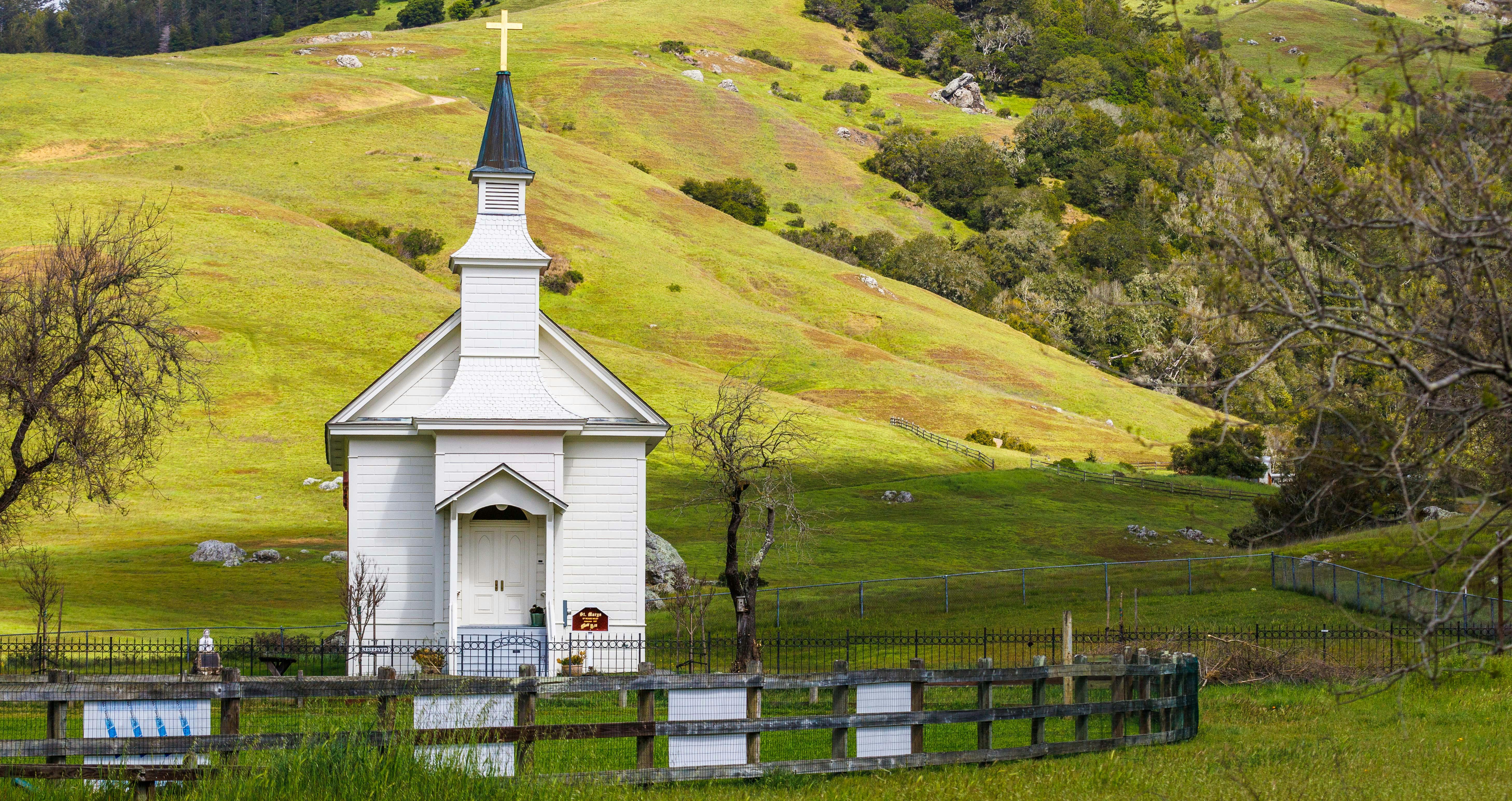 Wooden church on lake shore against cloudy sky in countryside · Free ...