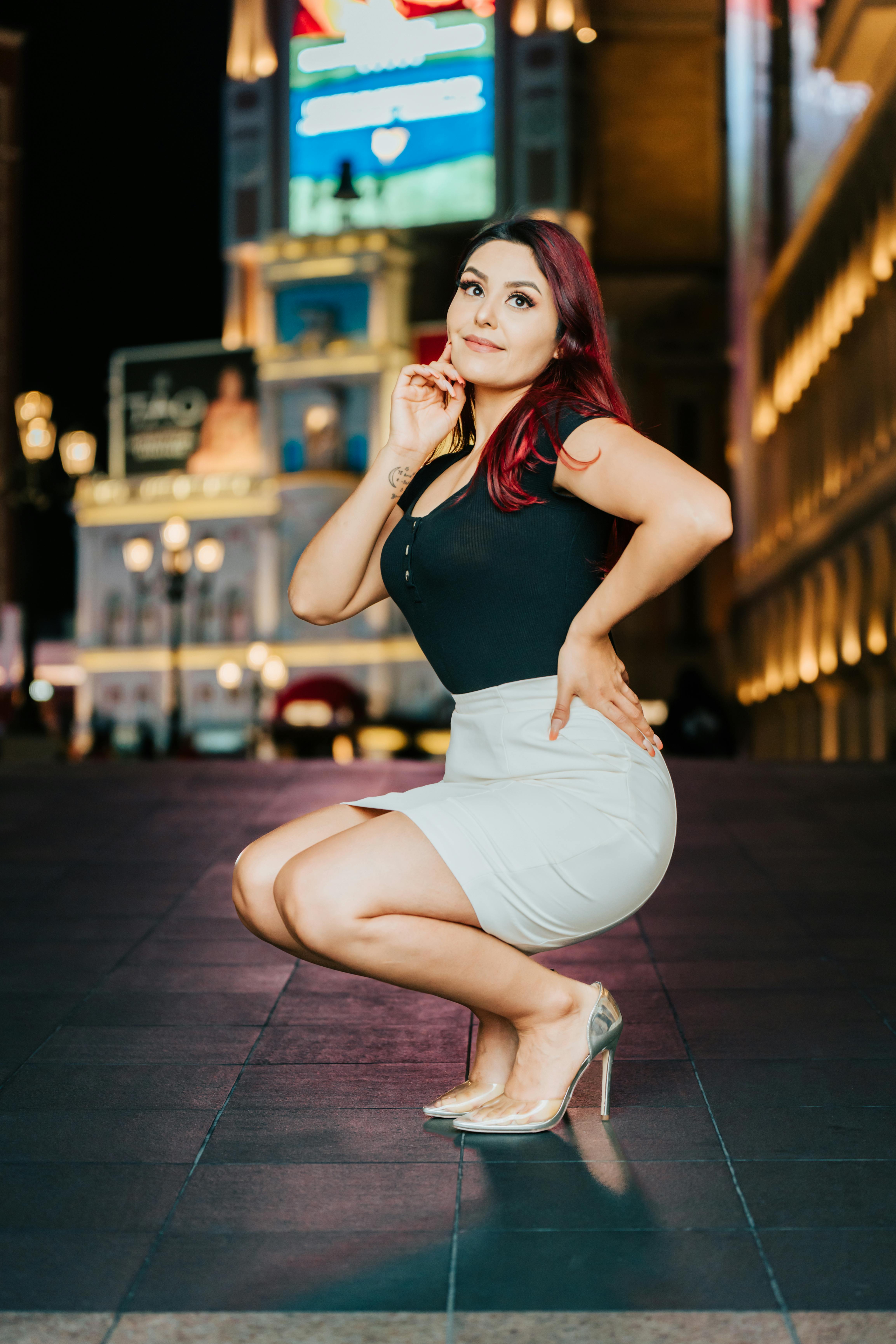 Woman Wearing Black Crop Top and Orange Skirt Standing · Free Stock Photo
