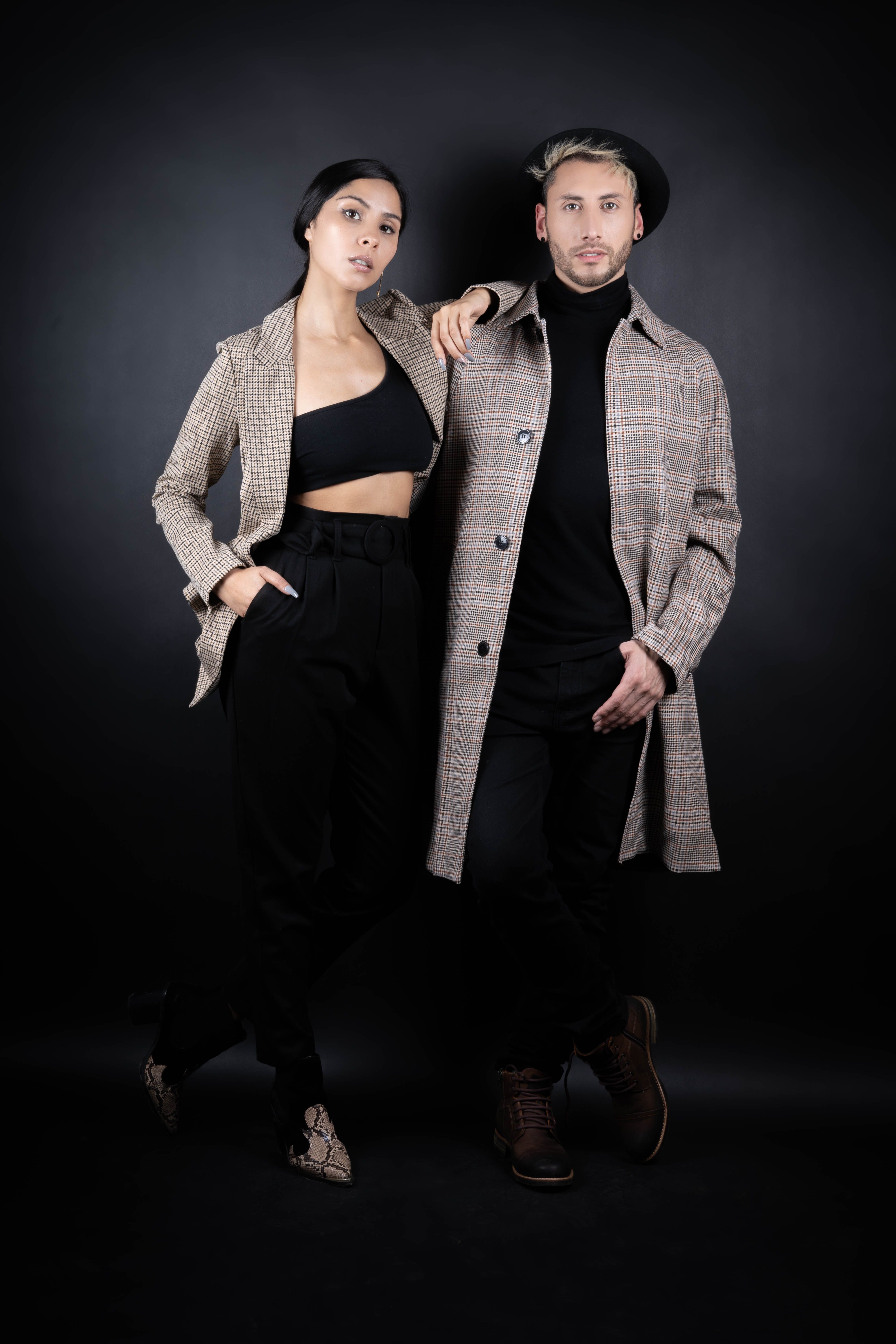 Stylish Man and Woman Posing · Free Stock Photo