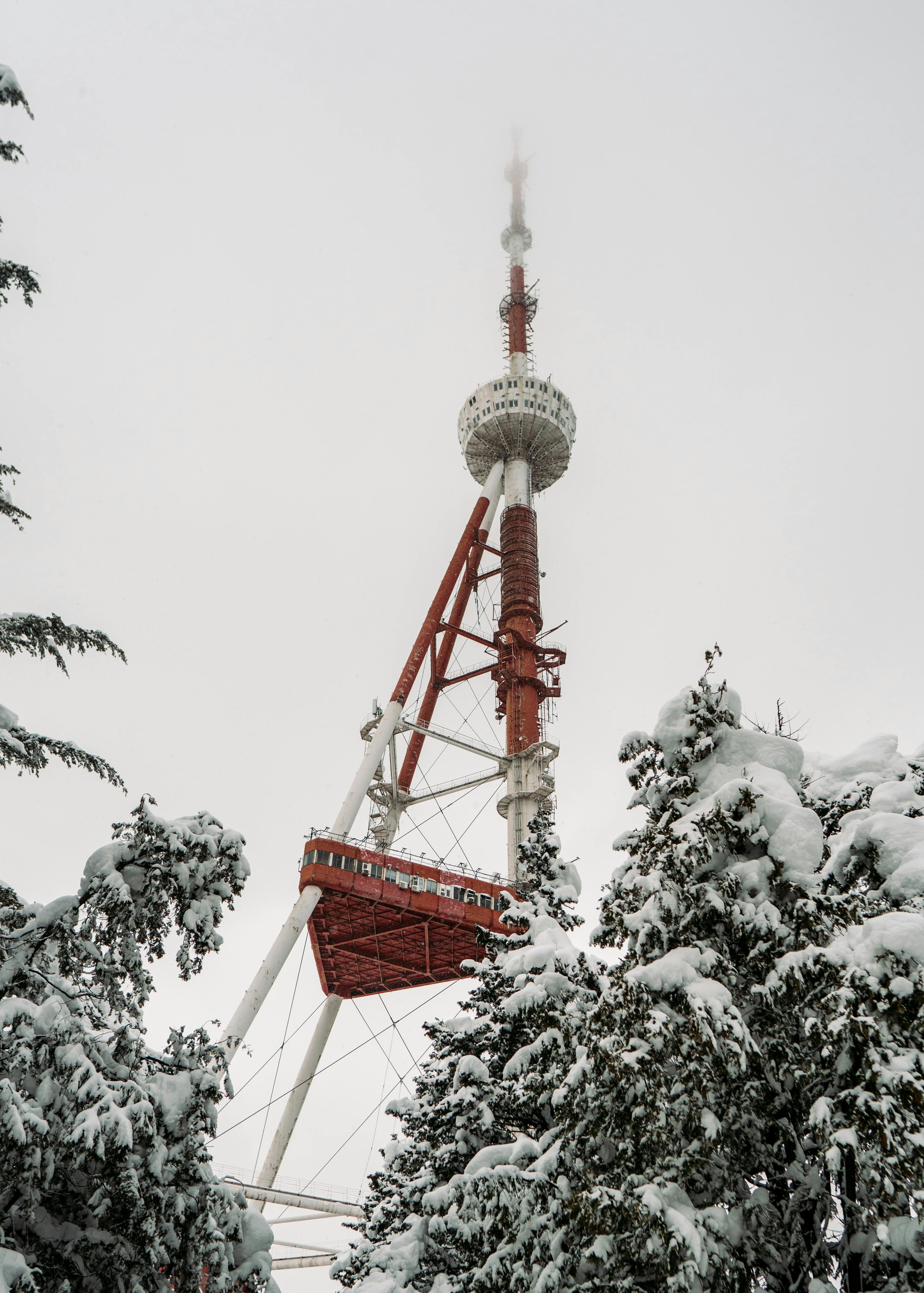 Cell Tower on Snow Covered Ground · Free Stock Photo