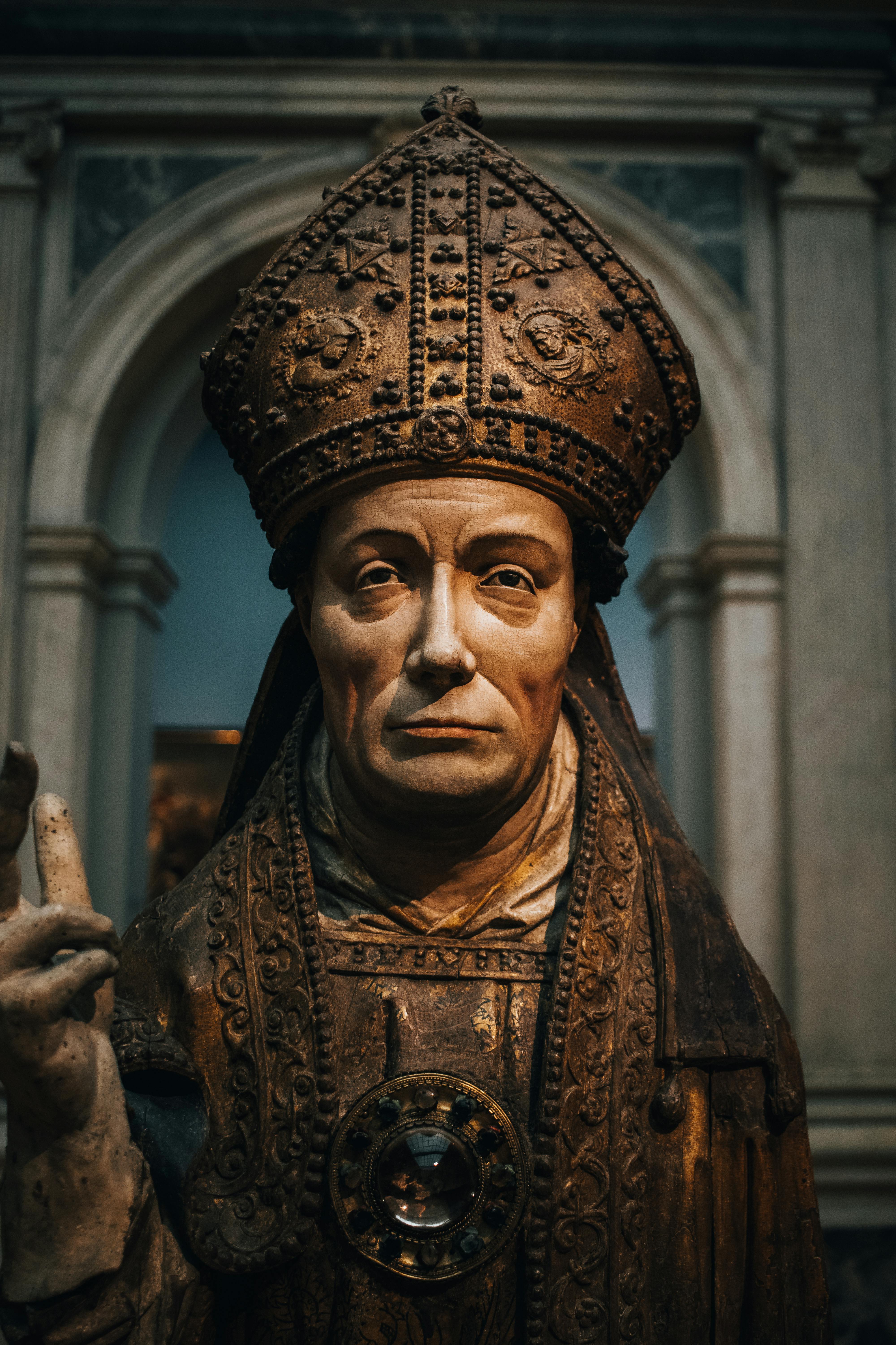 Headshot Photo of a Statue of a Pope · Free Stock Photo