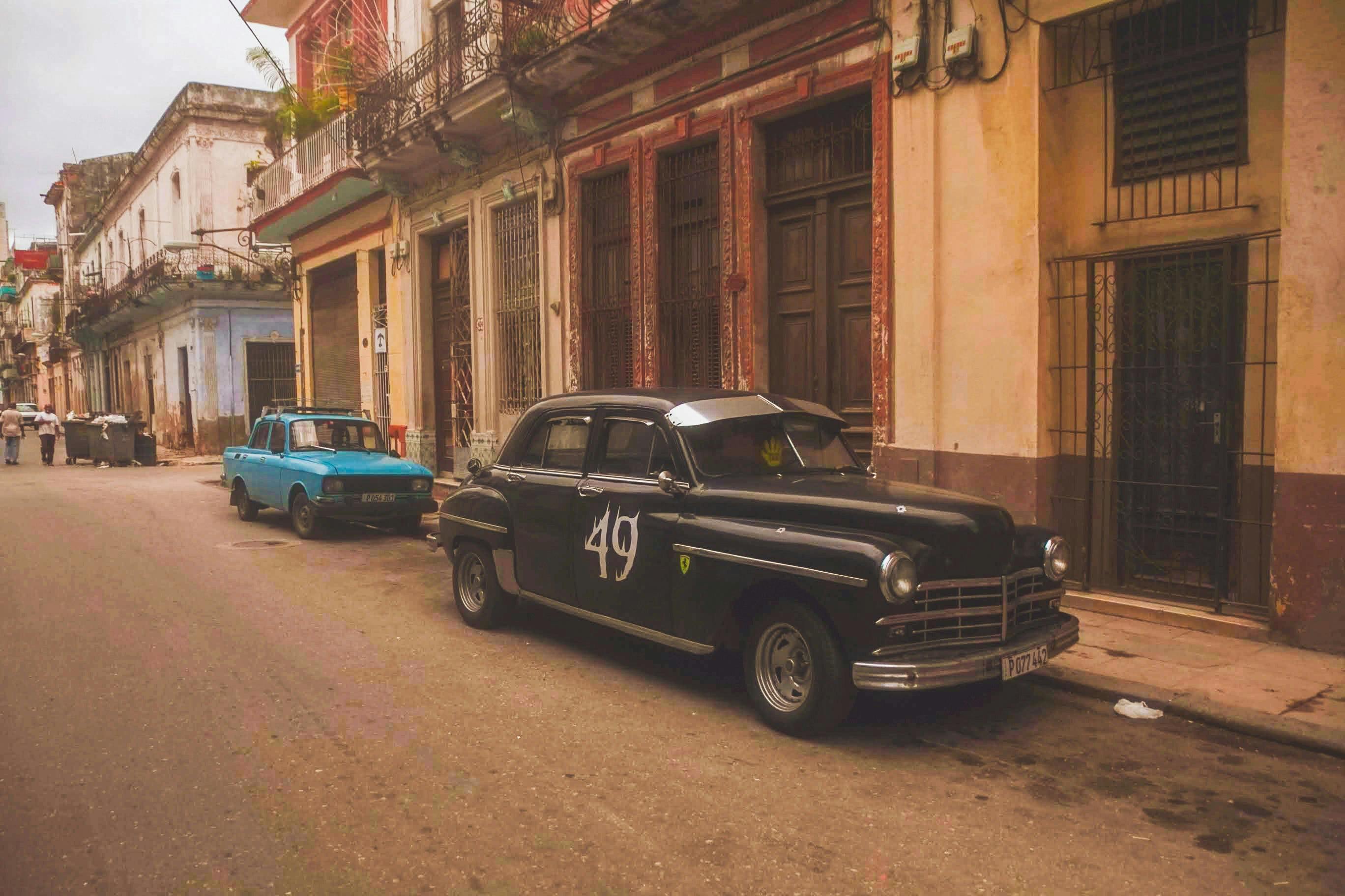 Cars Parked Near Buildings during Daytime · Free Stock Photo