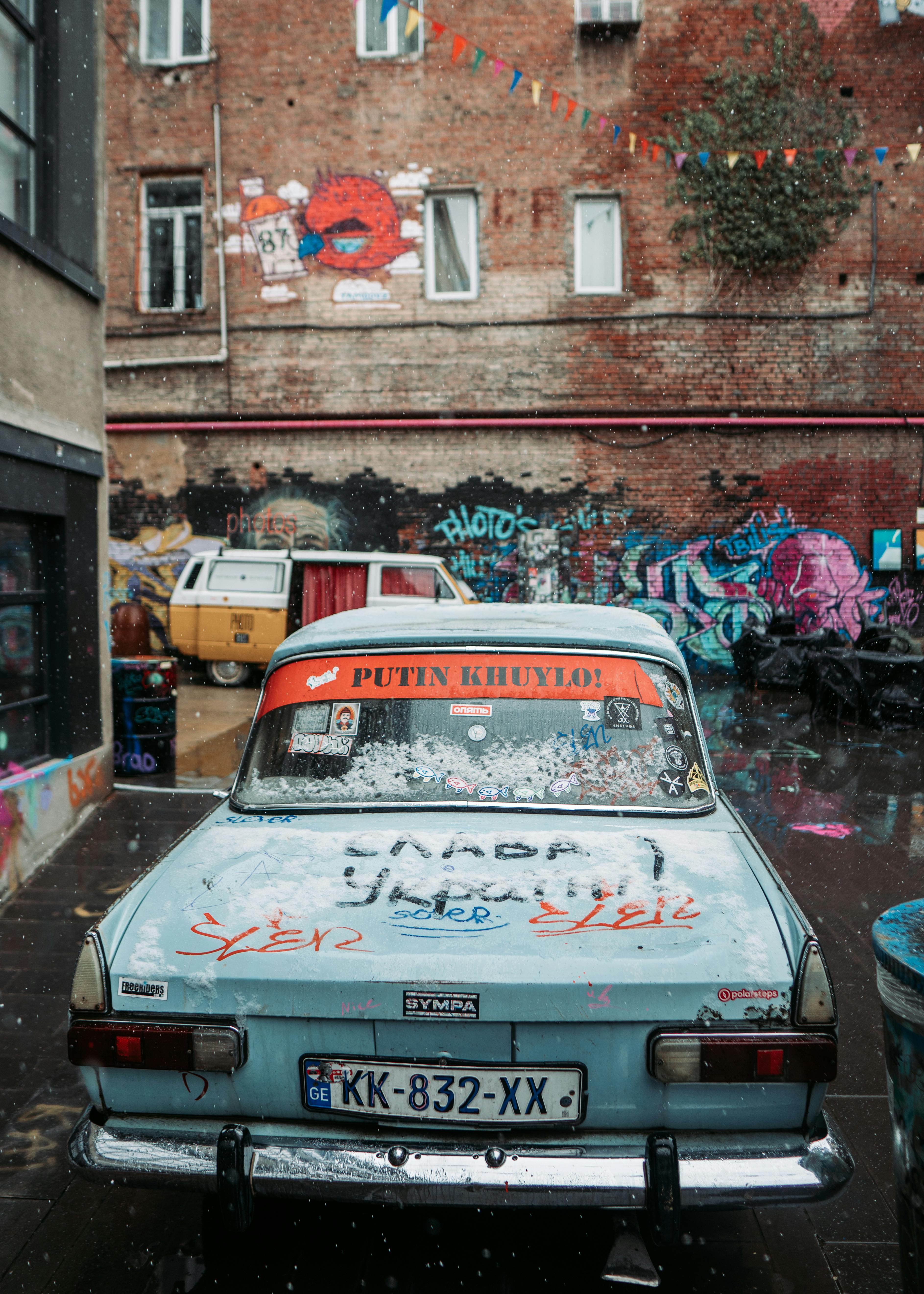 A Vandalized Vintage Car · Free Stock Photo