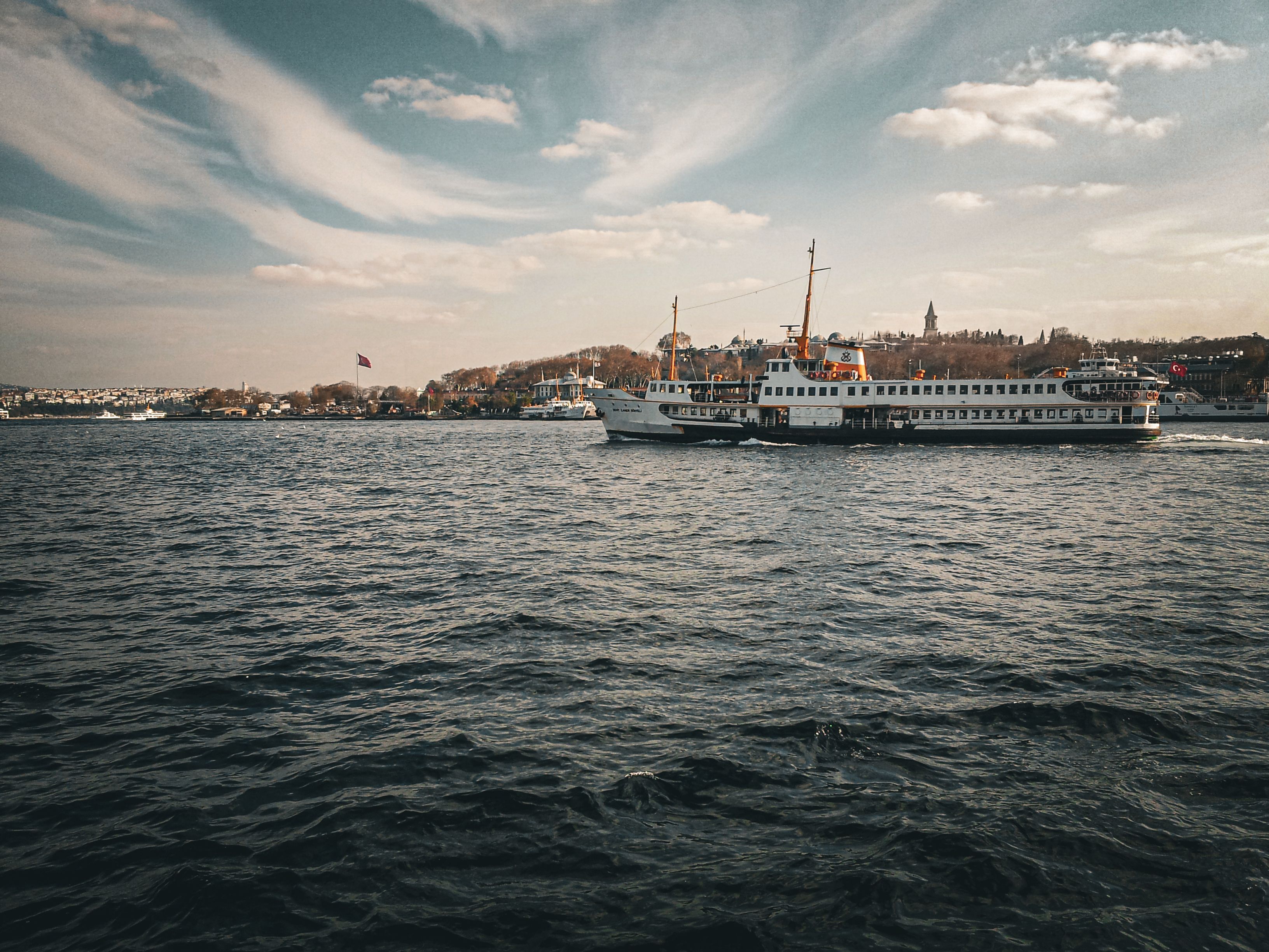 White Cruise Ship on Blue Ocean under the Blue Sky · Free Stock Photo
