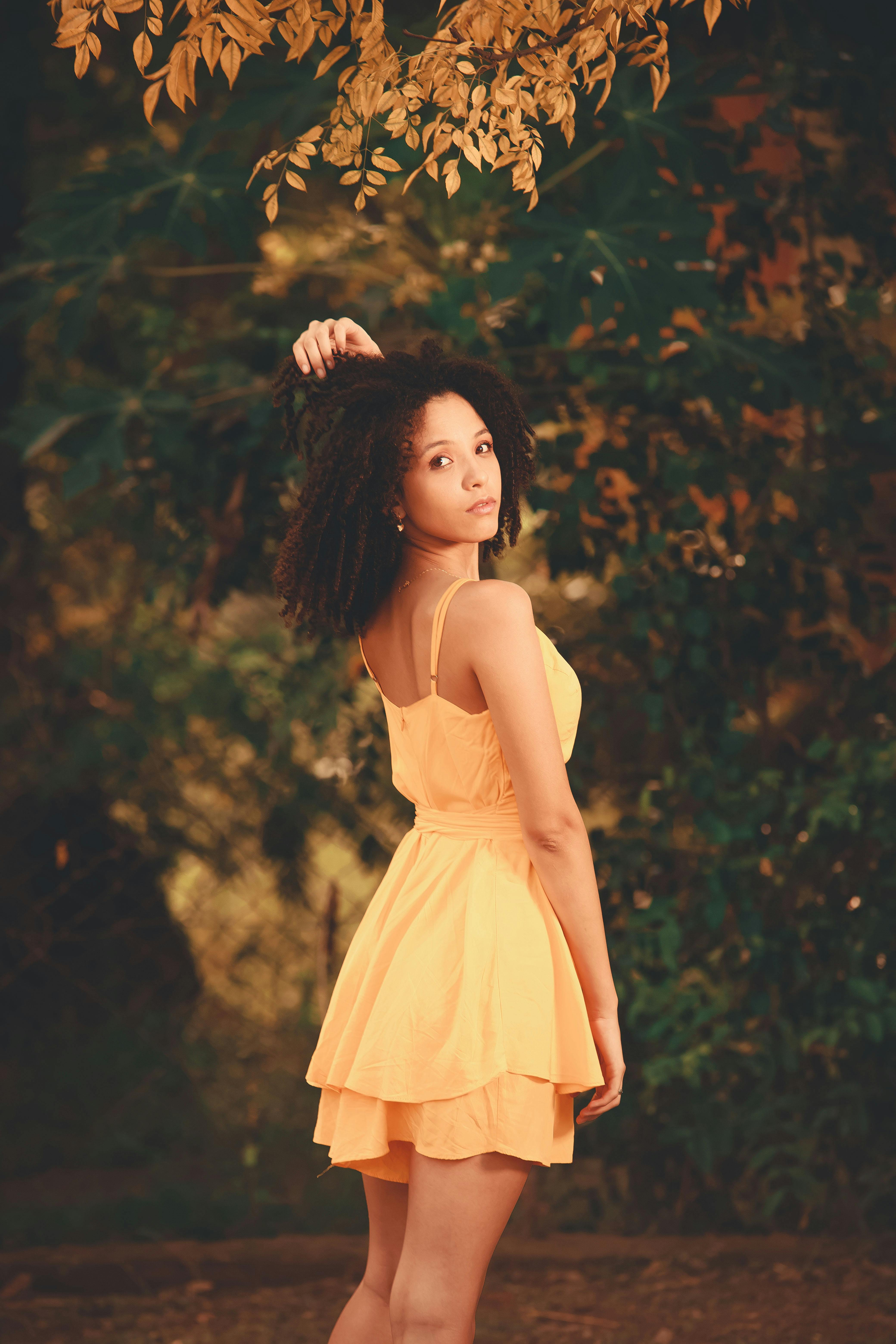 Beautiful Woman in Suit Looking in Mirror · Free Stock Photo