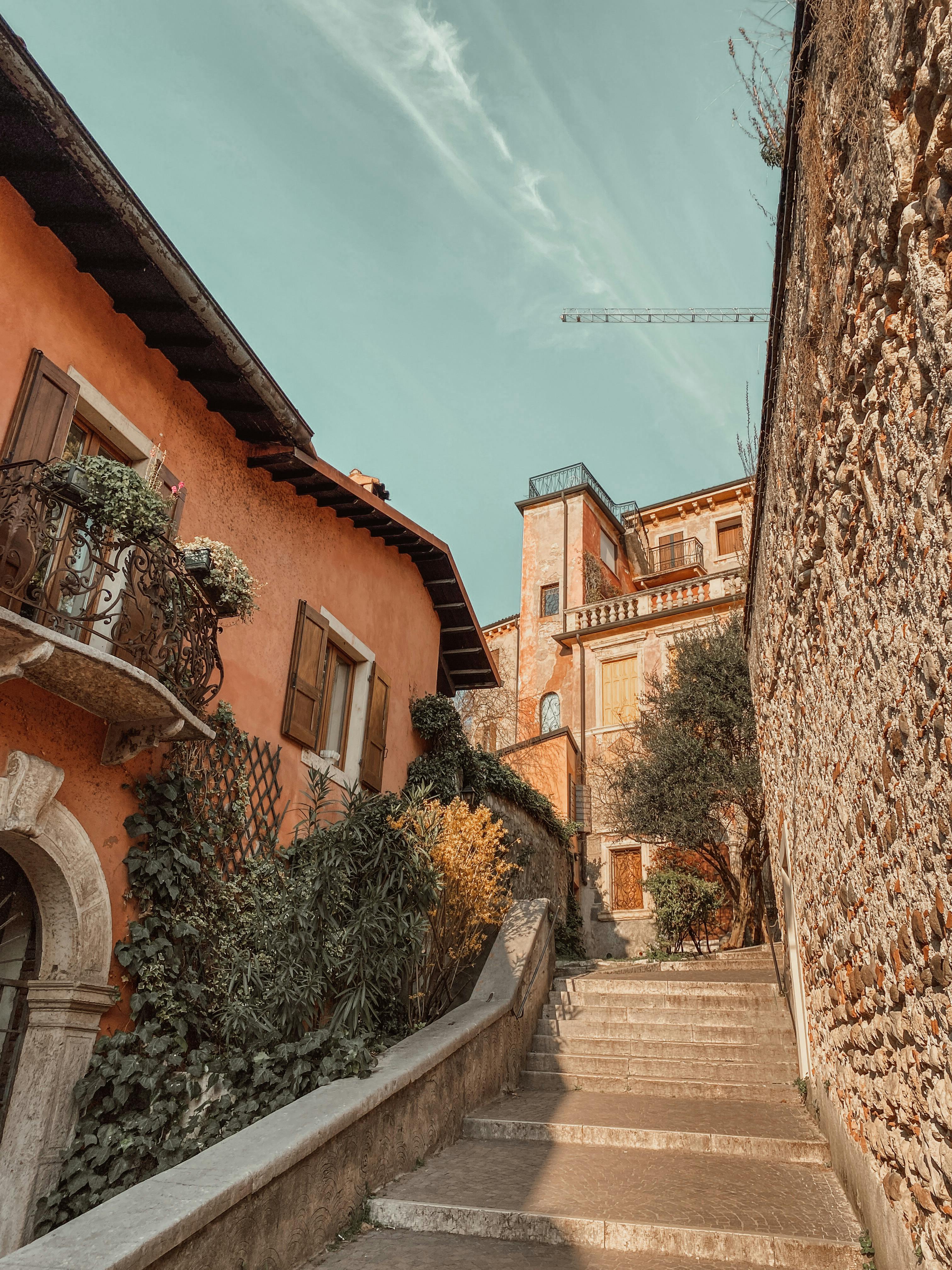 Alley Between Run Down Buildings · Free Stock Photo