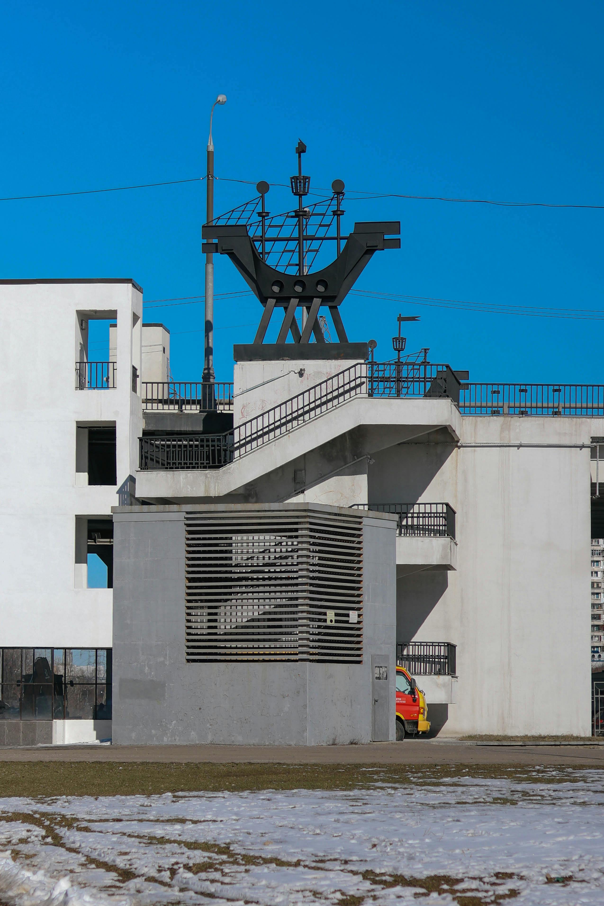 Ship Statue atop a Staircase · Free Stock Photo