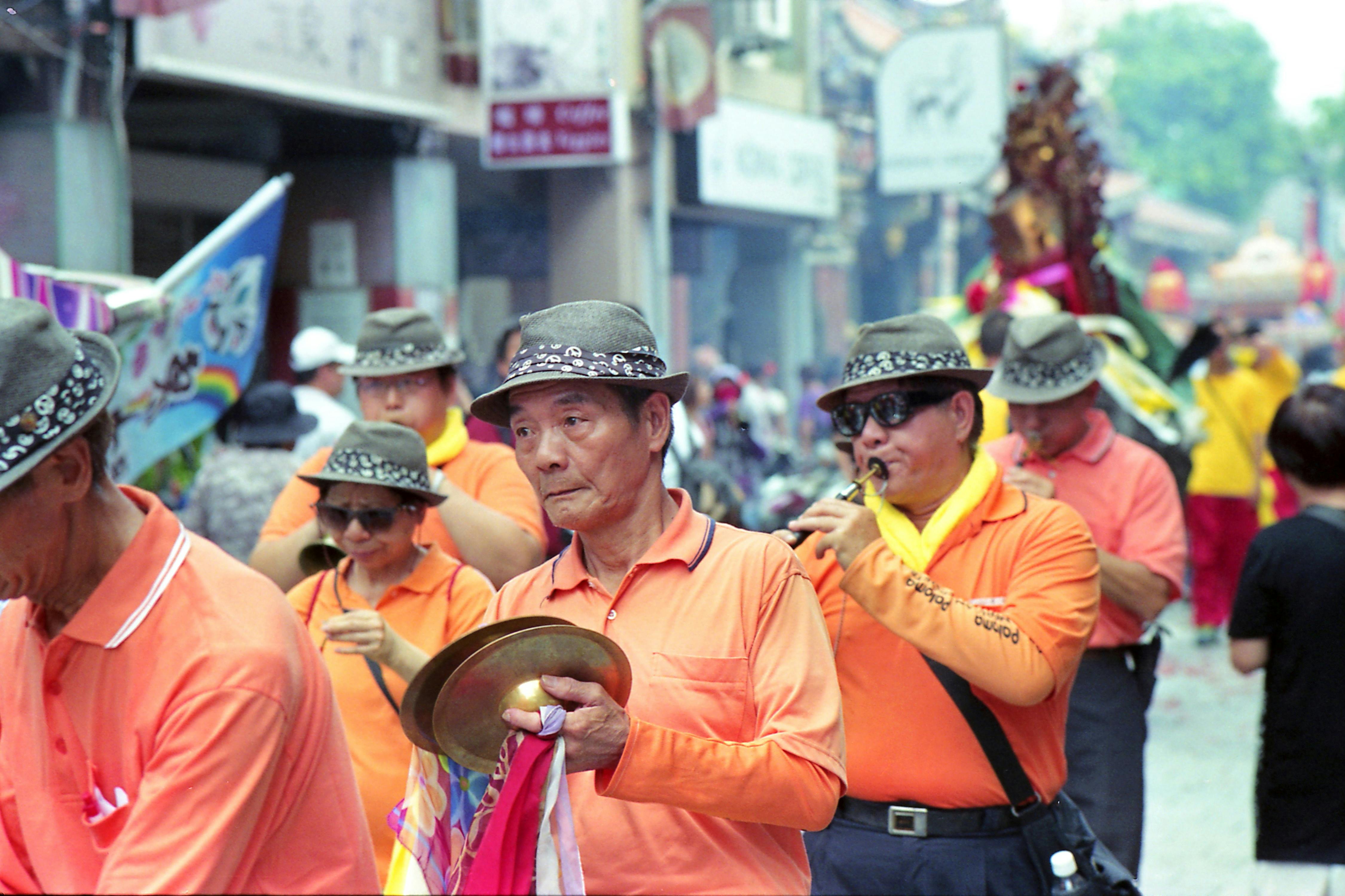 Men Walking and Playing Musical Instruments · Free Stock Photo