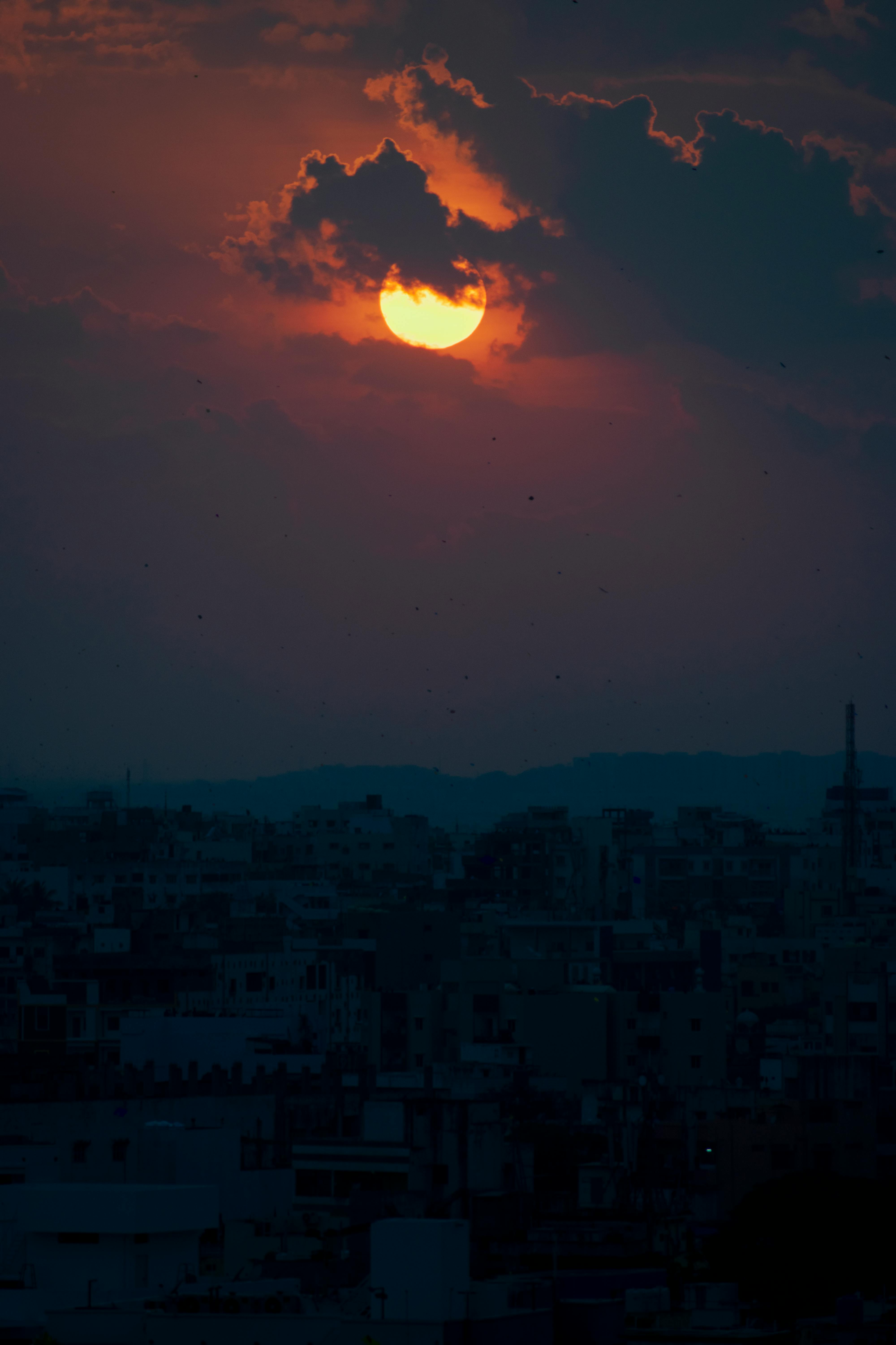 Clouds Covering the Sun at Sunset · Free Stock Photo