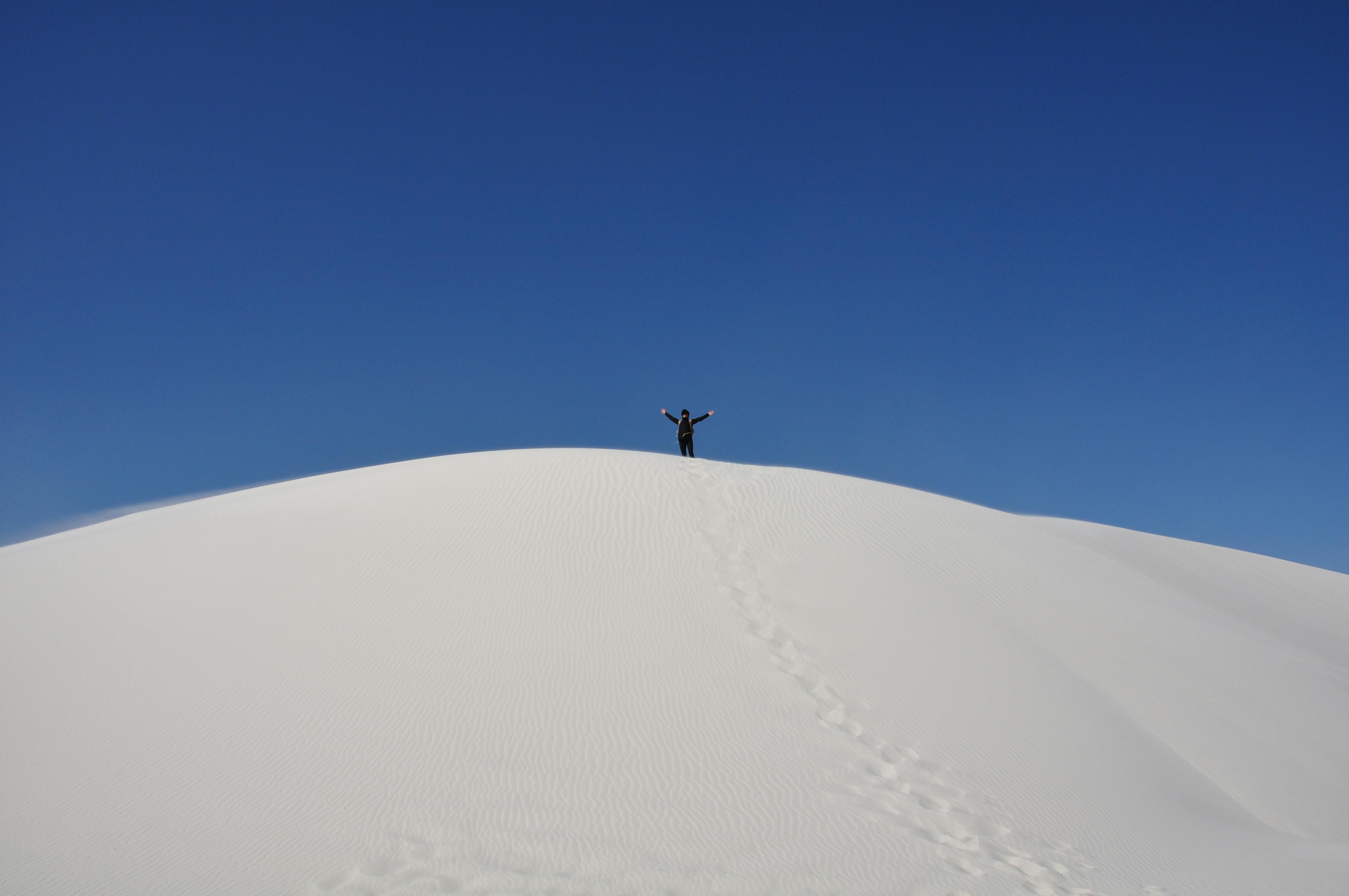 A Person Standing On Top Of A Mountain Photos, Download The BEST Free A ...