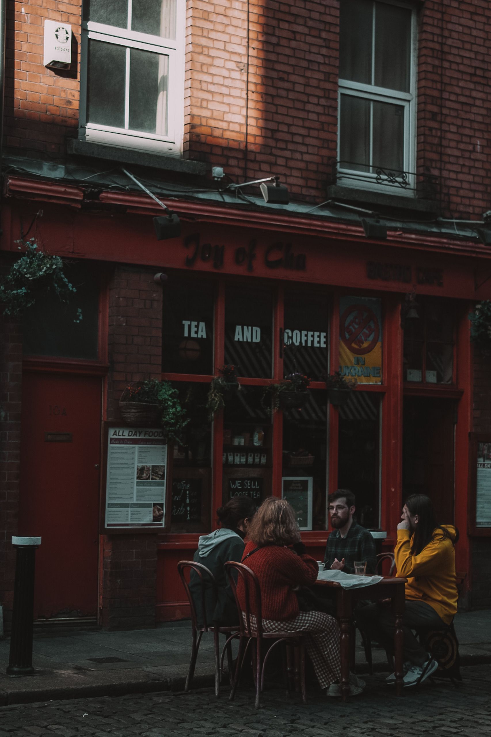 Sidewalk Cafe in a City Street · Free Stock Photo