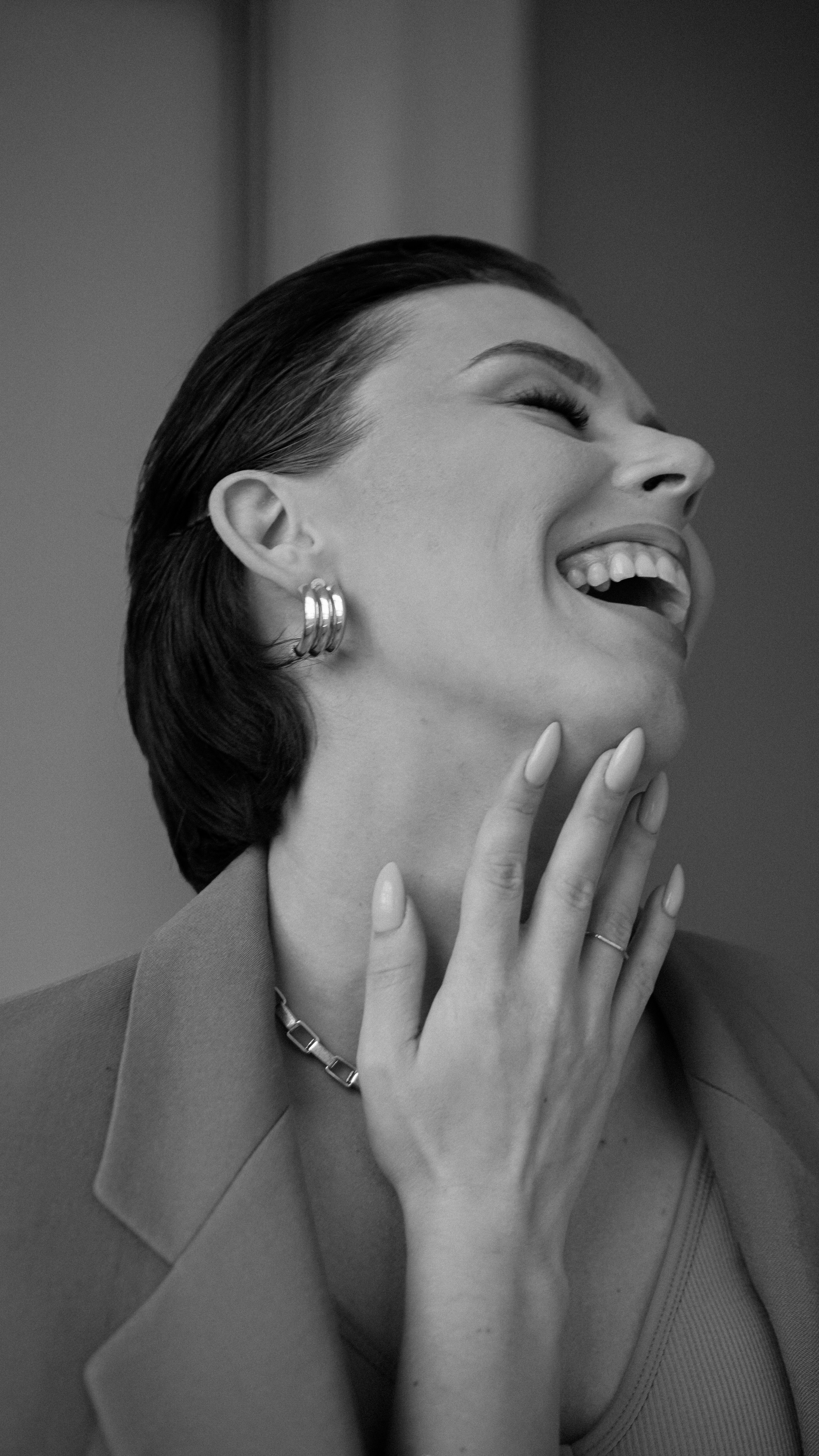 Portrait of Woman Laughing and Throwing Her Head Back · Free Stock Photo