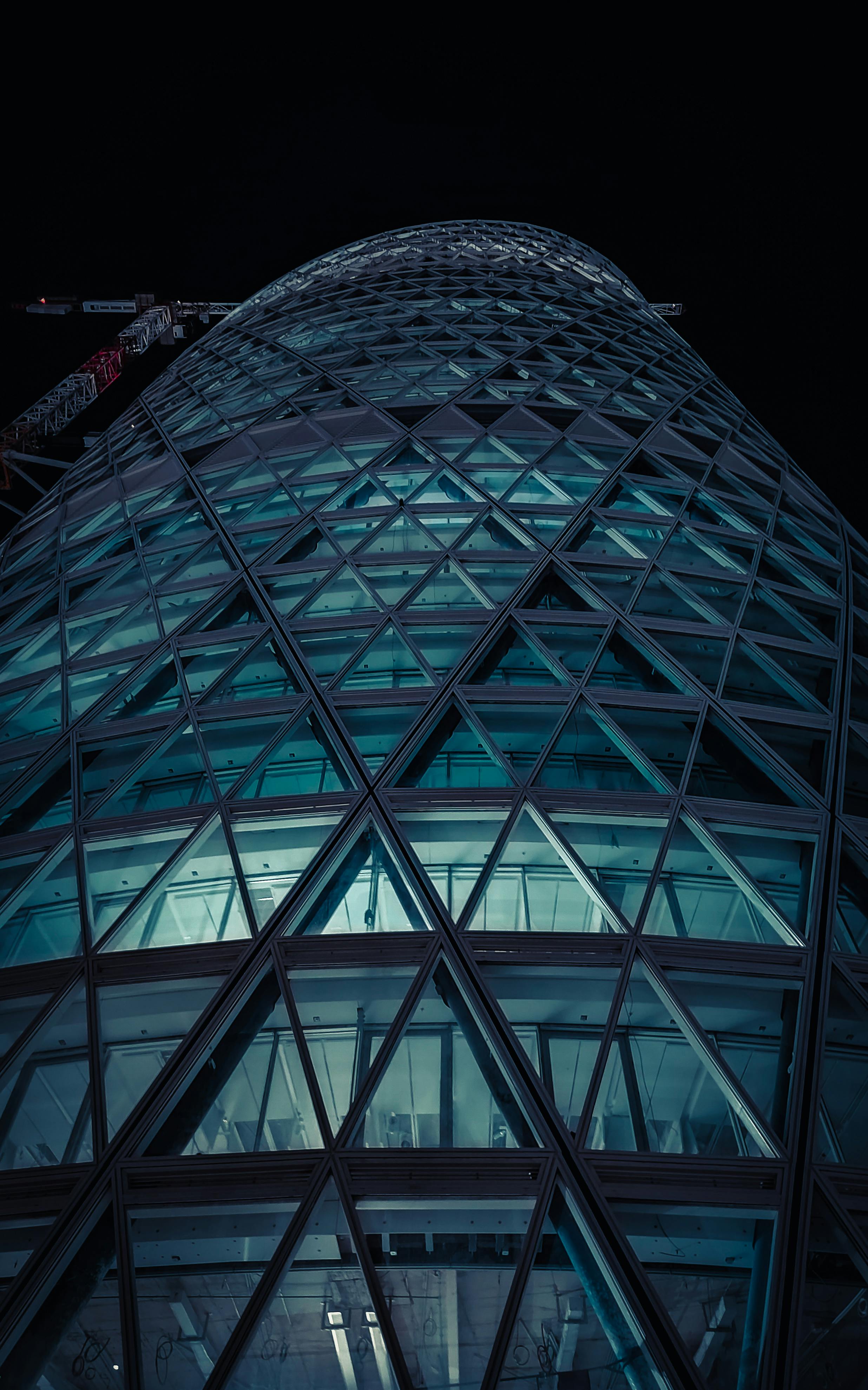 Low-Angle Photography of High Rise Building during Night Time · Free ...