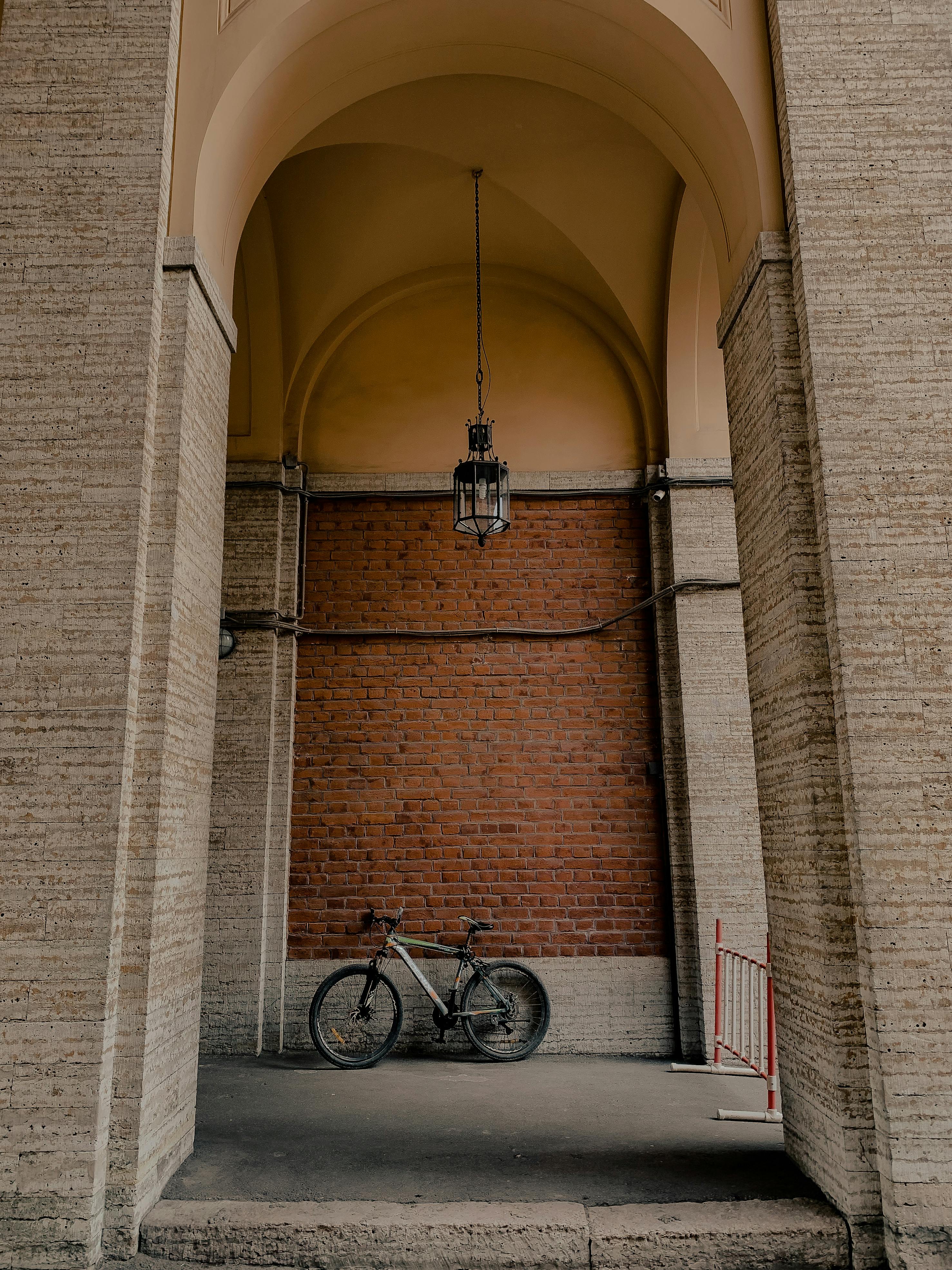 Bicycle Under Arch · Free Stock Photo
