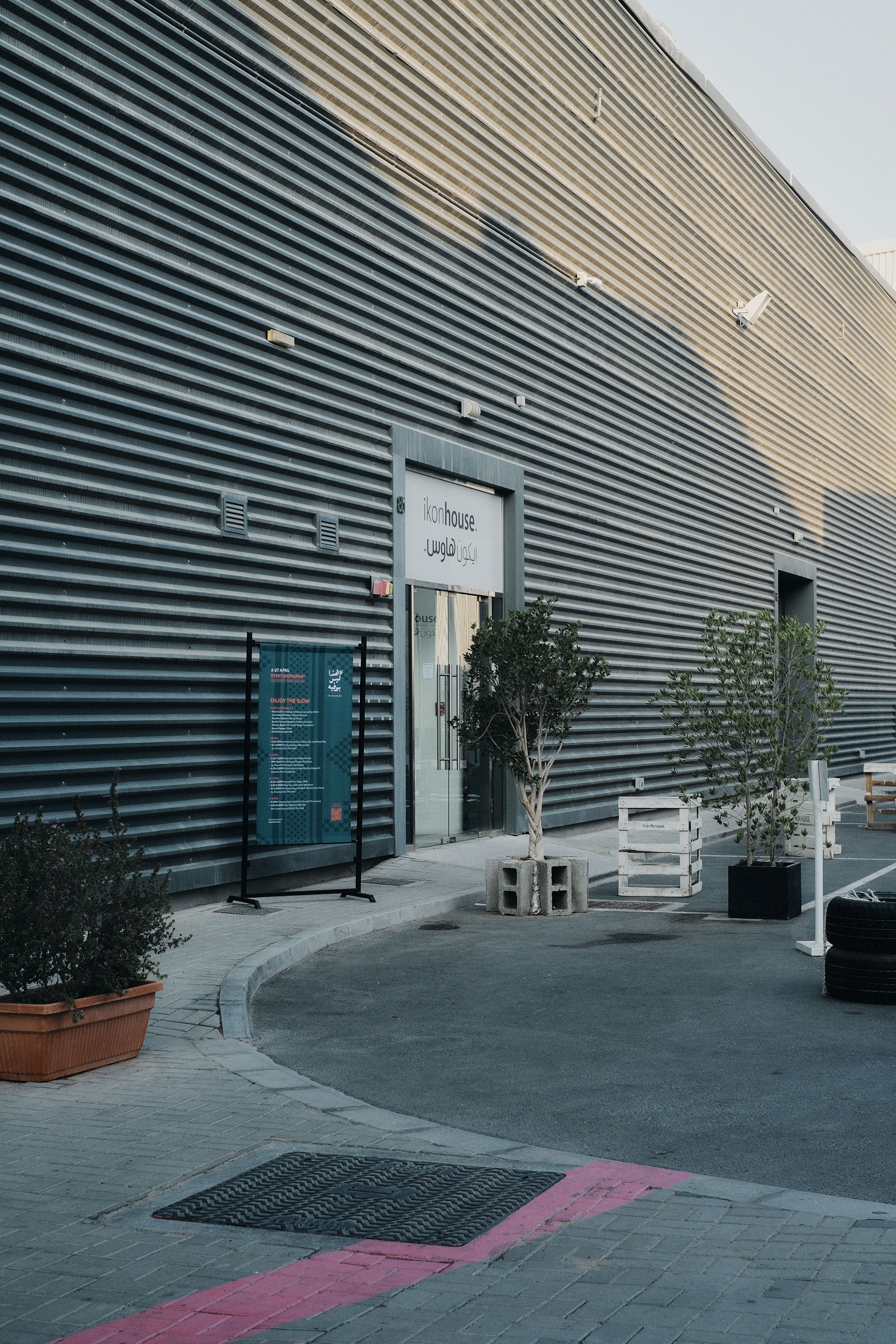 Green Plants Beside the Concrete Building · Free Stock Photo