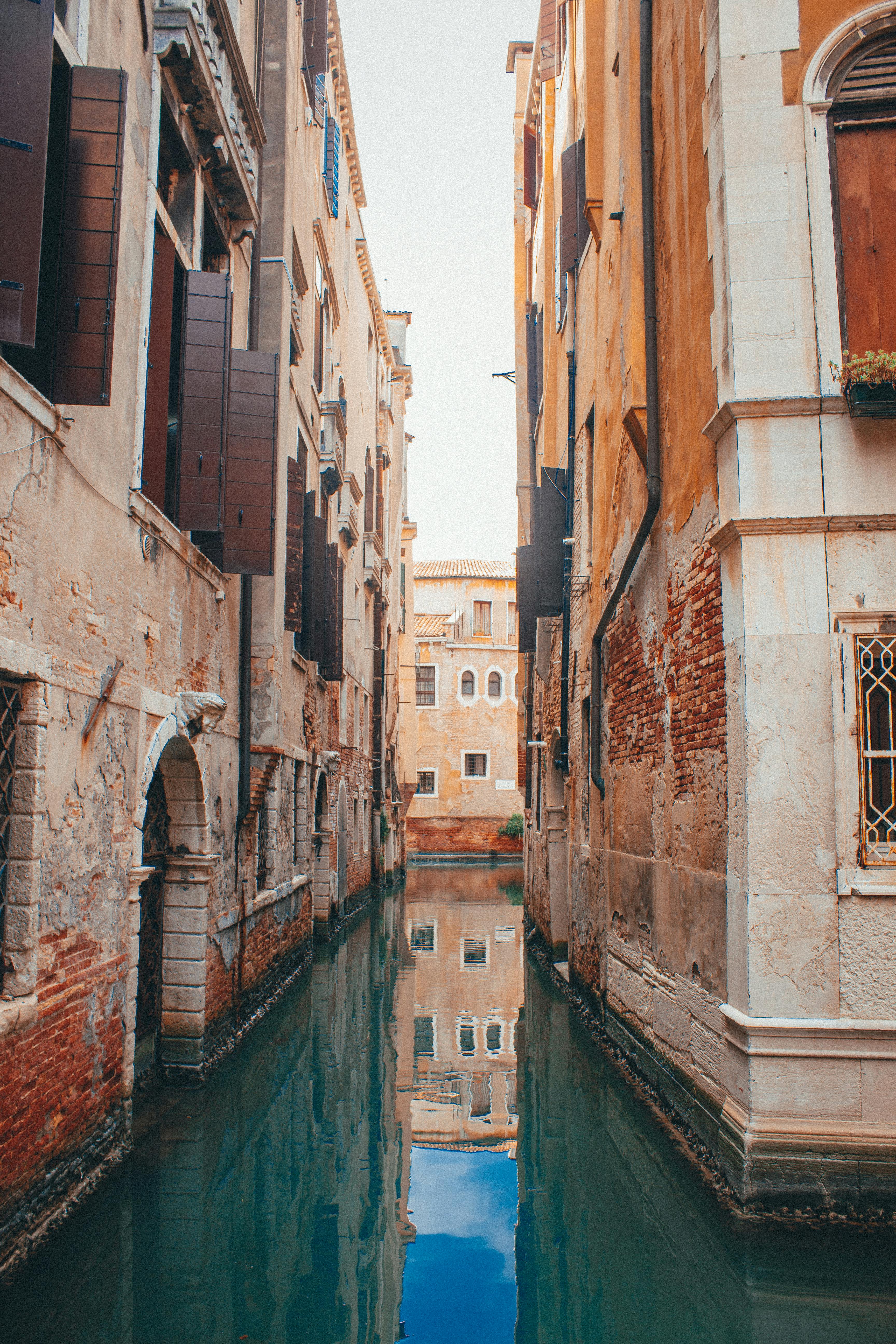 Water Canal Between Buildings · Free Stock Photo