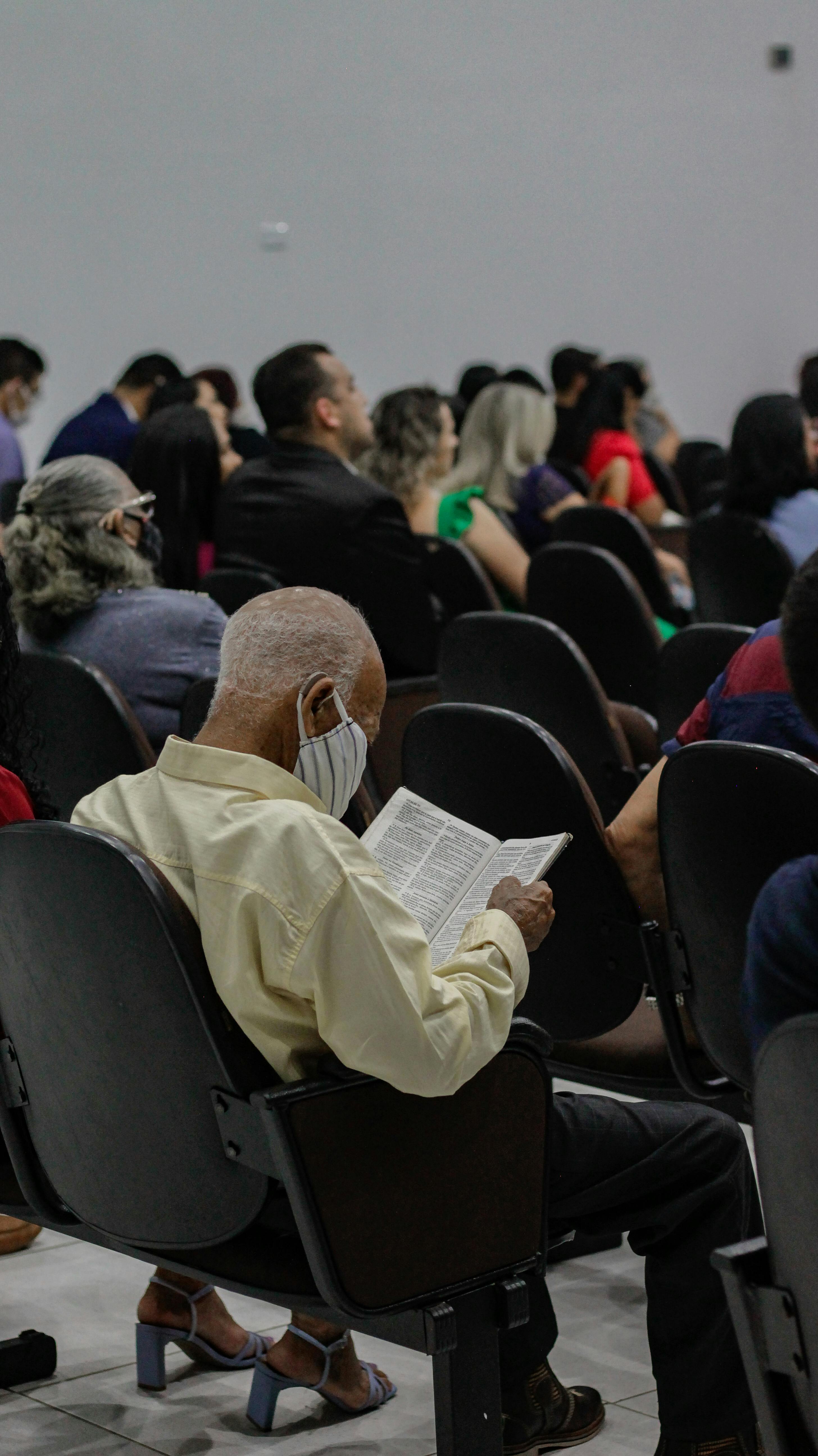 Back View of Woman Reading a Book · Free Stock Photo