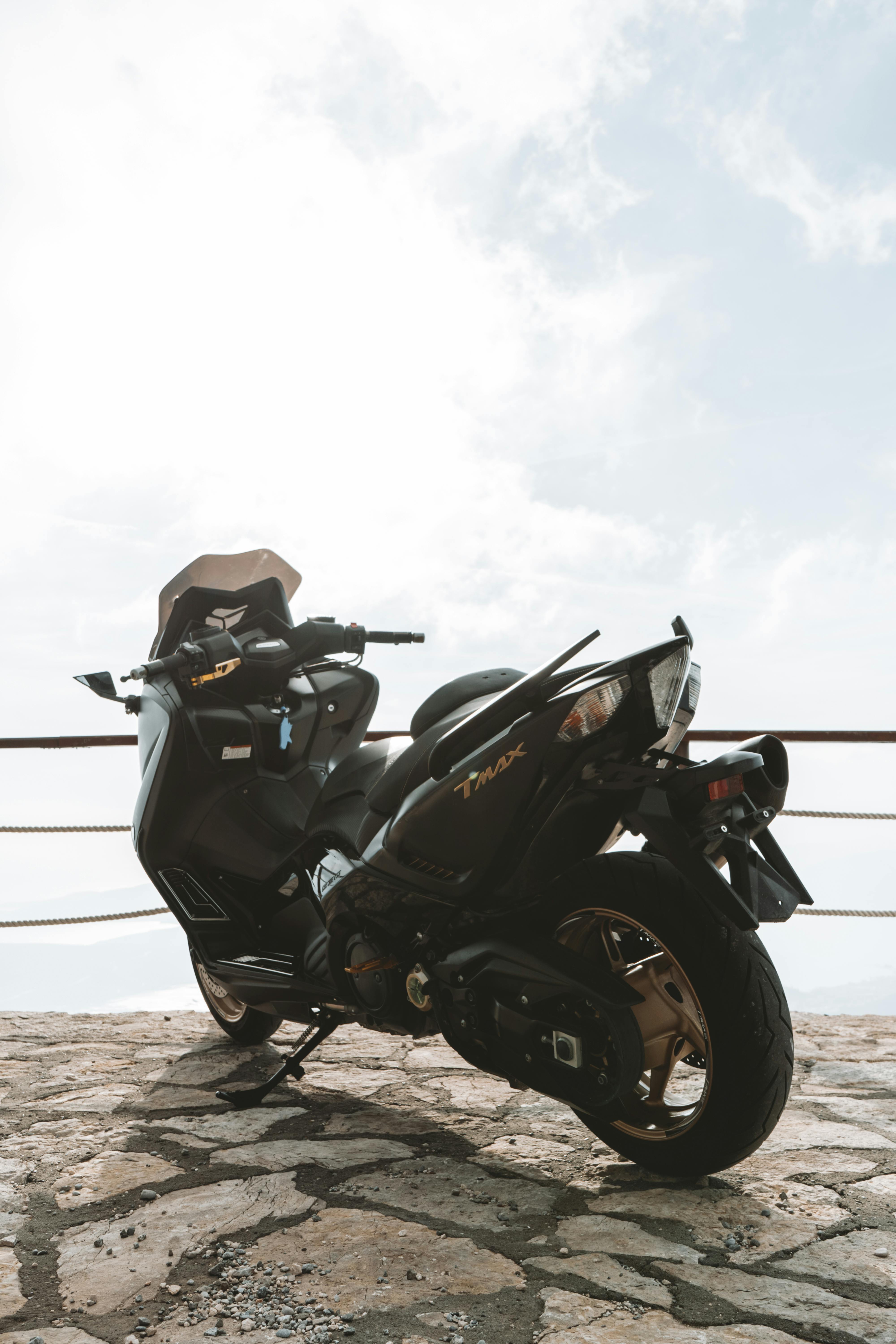 Gray and Silver Cruiser Motorcycle Near Green Grass Lawn · Free Stock Photo