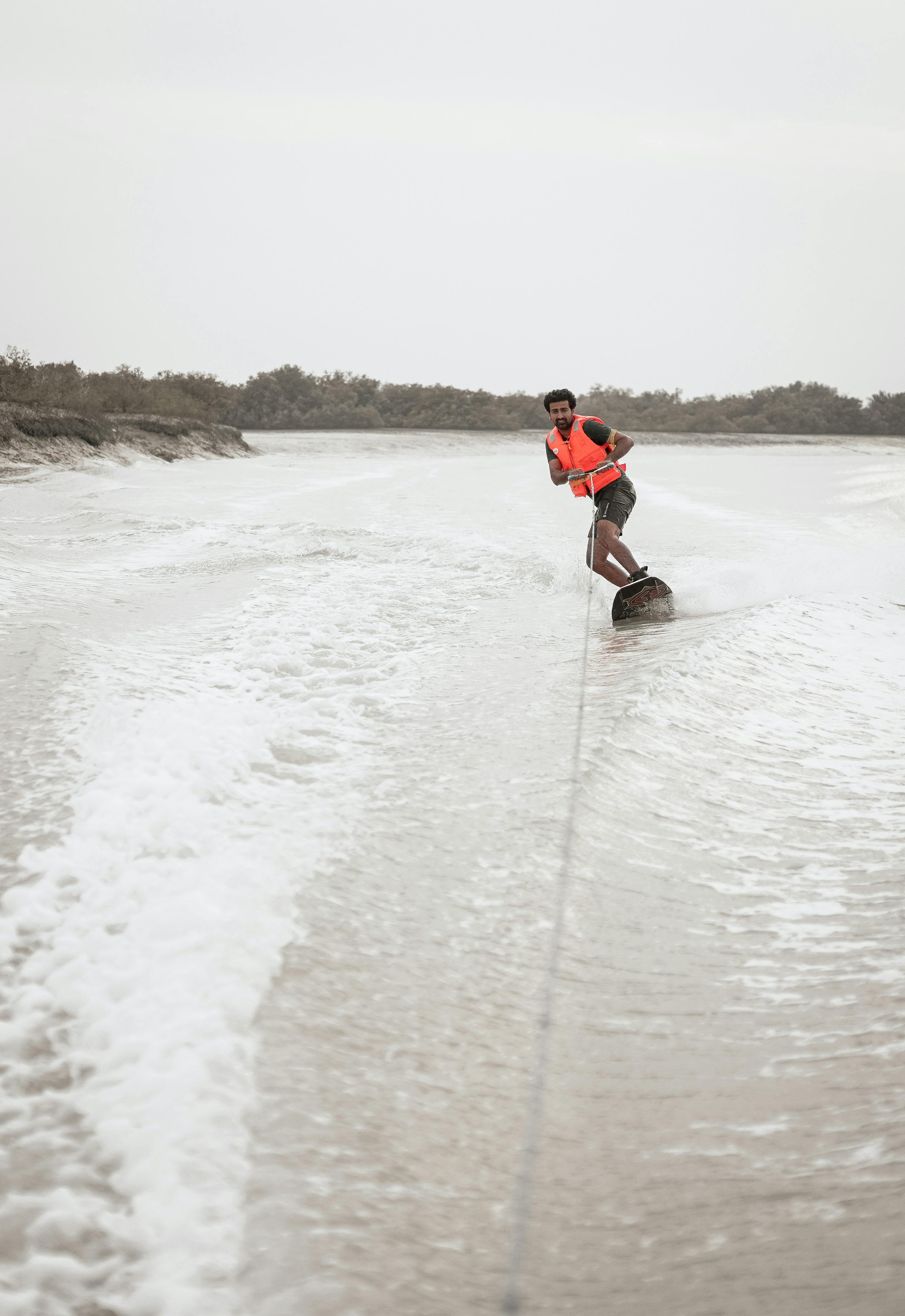 Woman riding Surfboard · Free Stock Photo