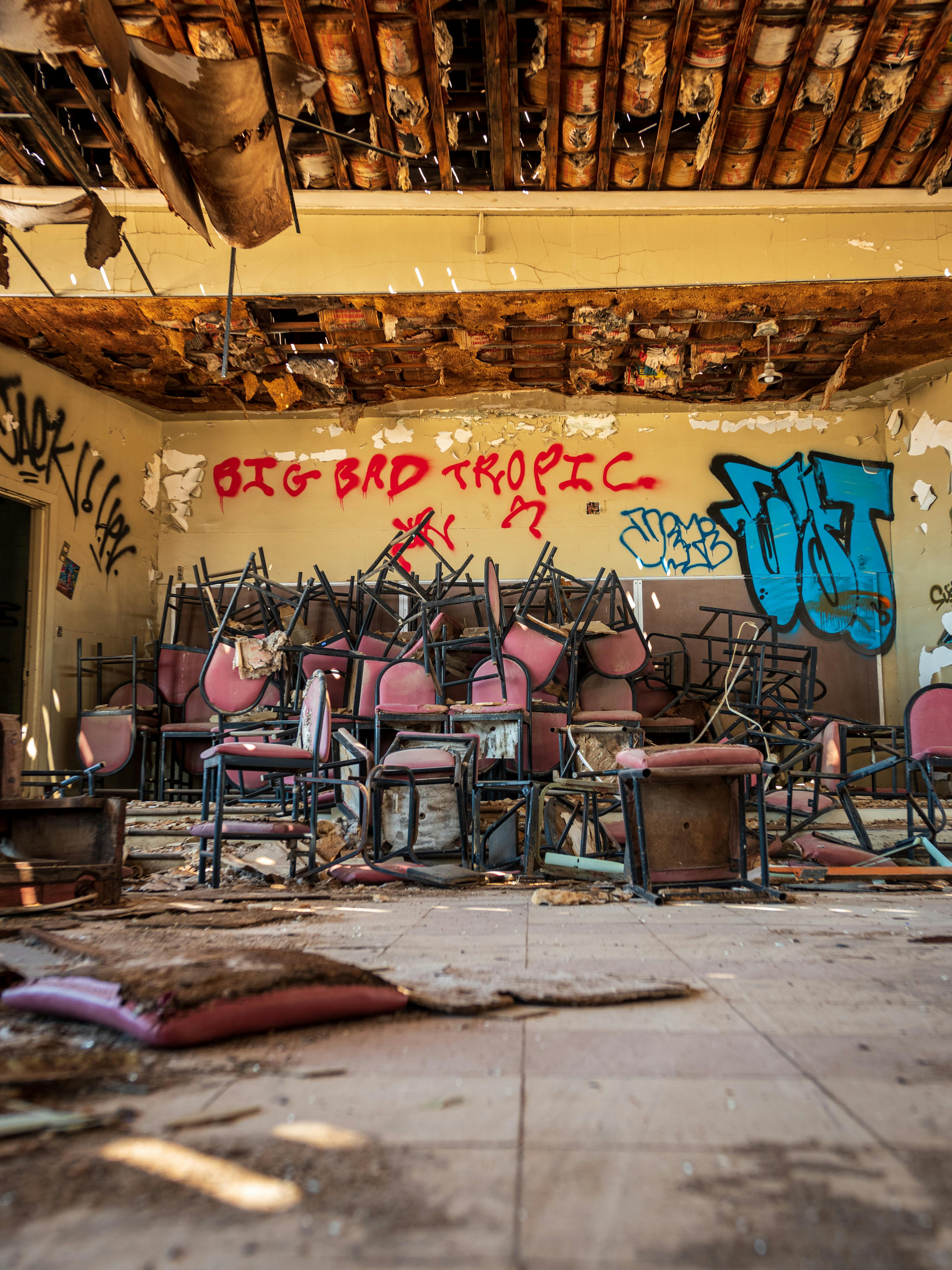 Stacked Abandoned Chairs · Free Stock Photo