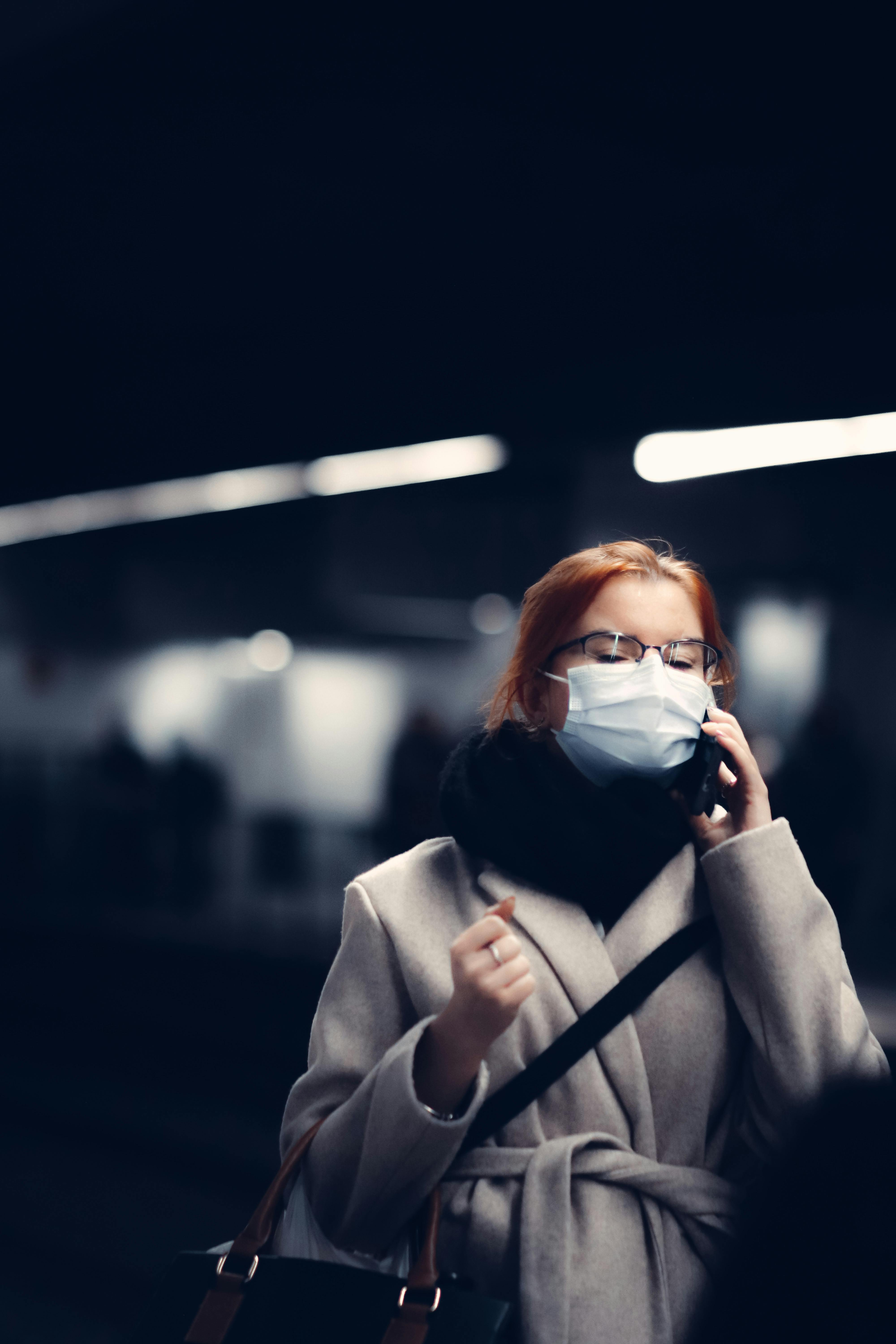 Curly Haired Woman Wearing Face Mask · Free Stock Photo