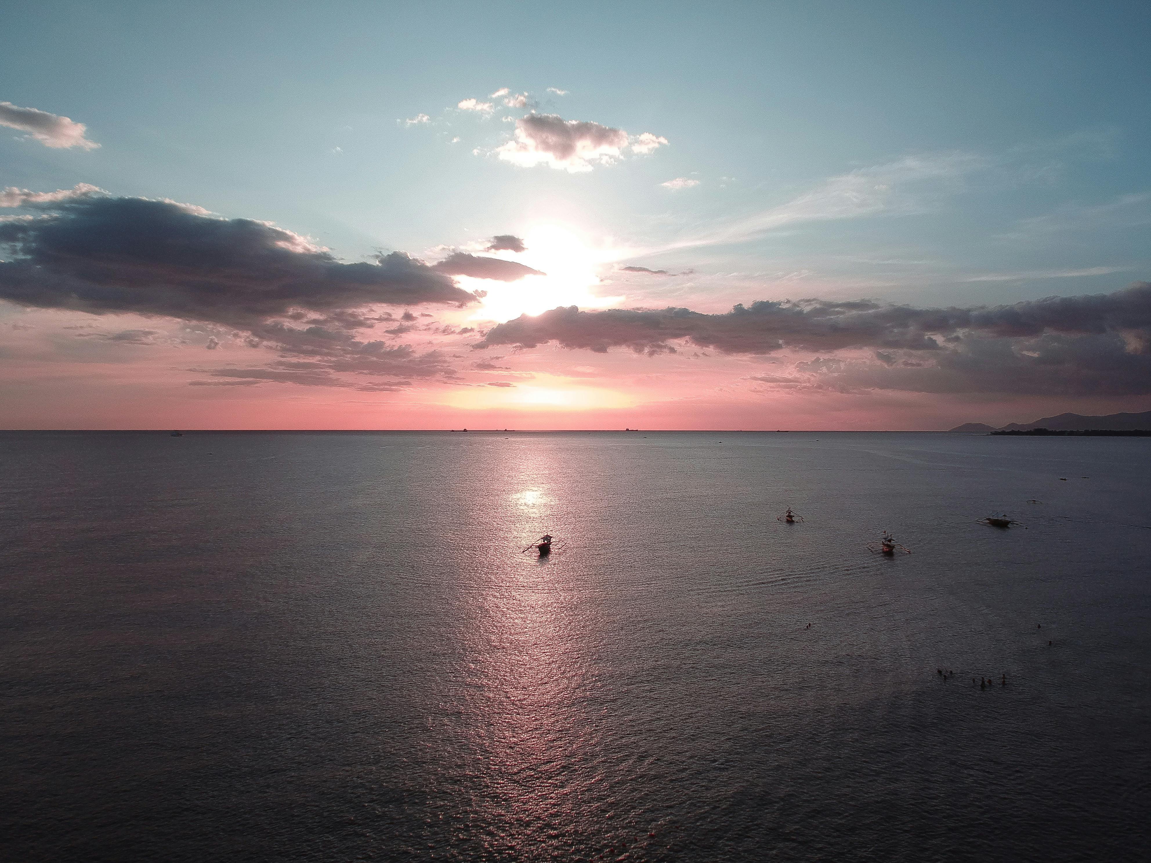 Photo of Ocean during Sunset · Free Stock Photo