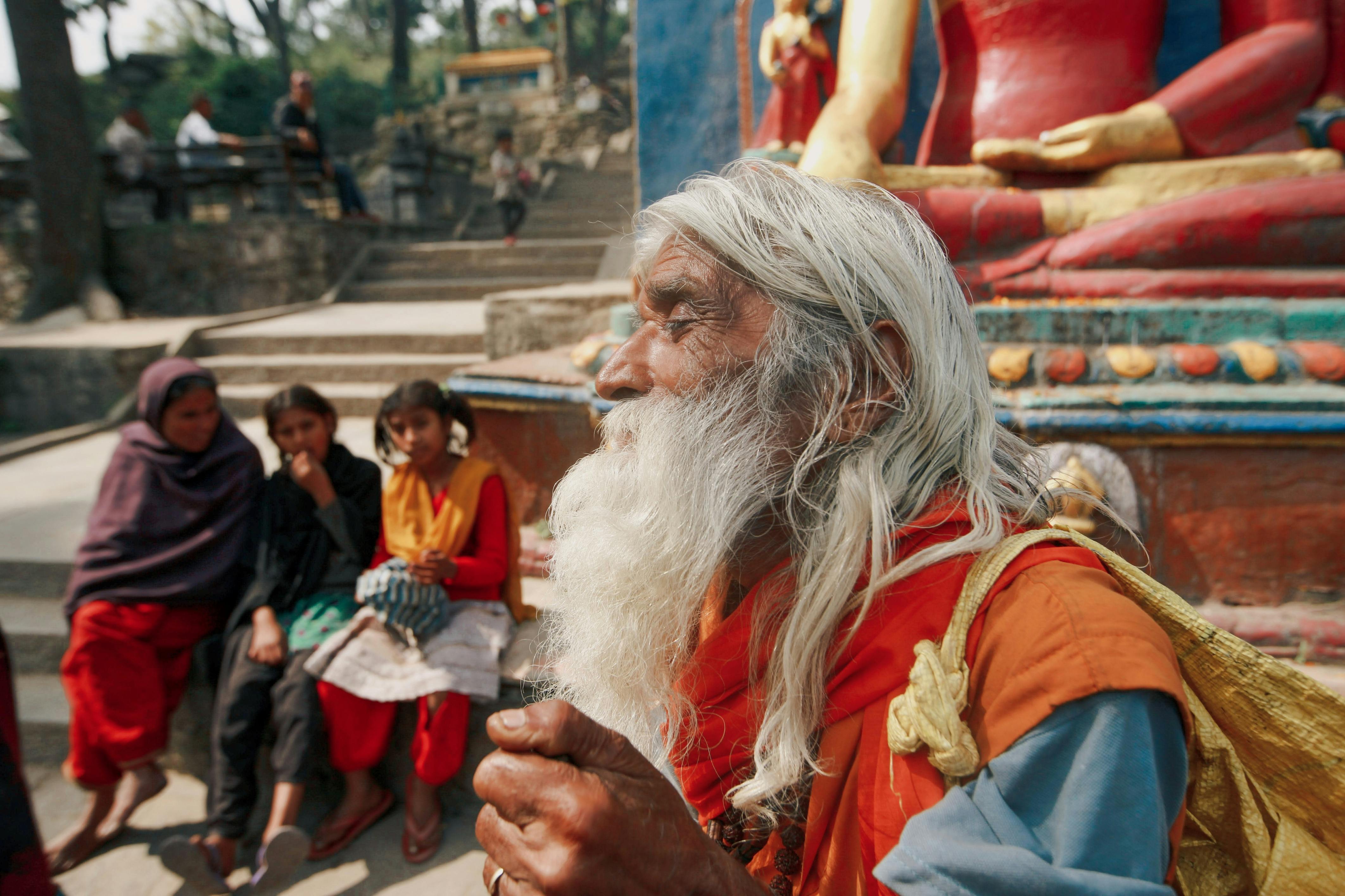 Monks Sitting on Temple Steps · Free Stock Photo