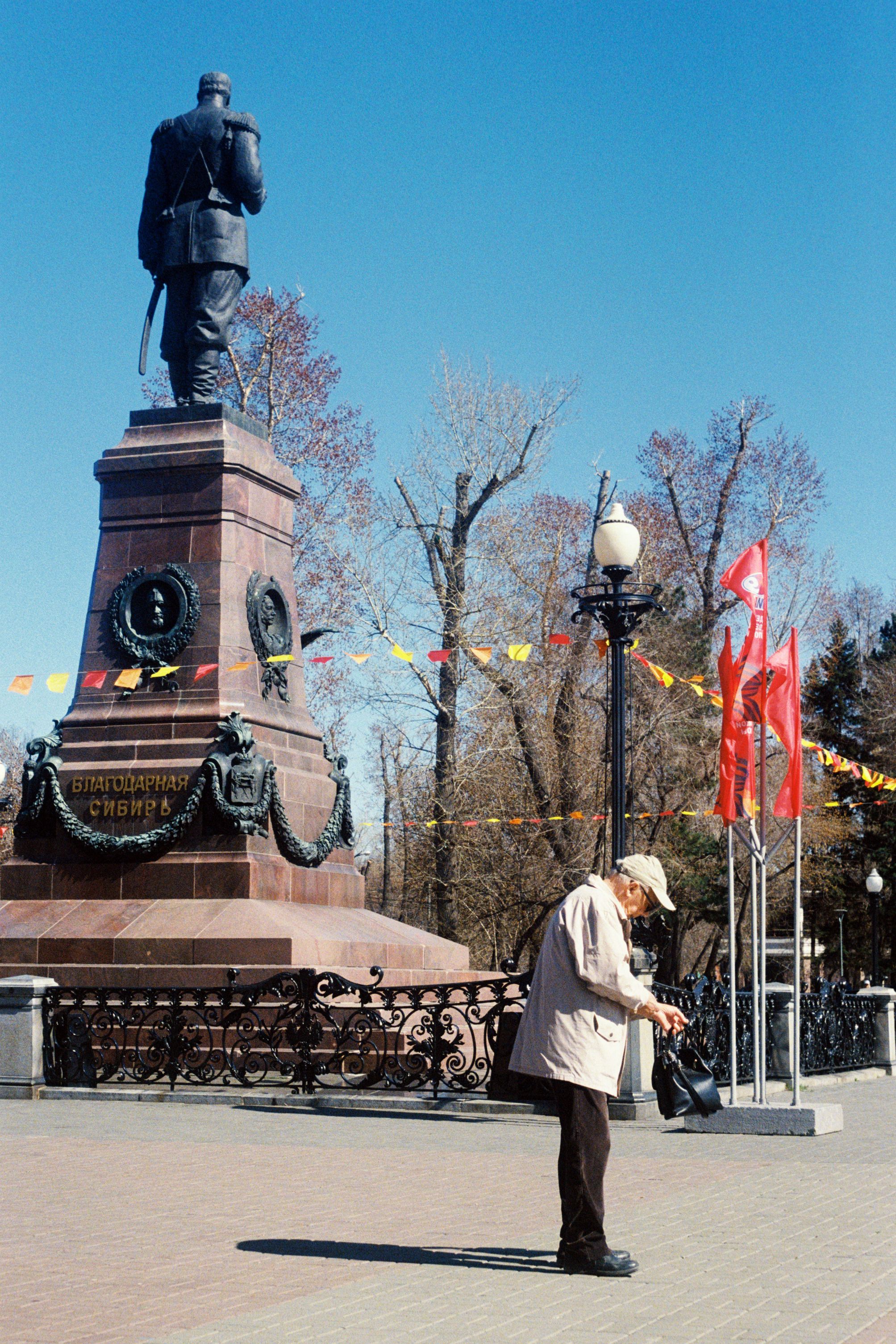 A Elderly Man Standing Beside a the Monument of Alexander III in Oblast ...