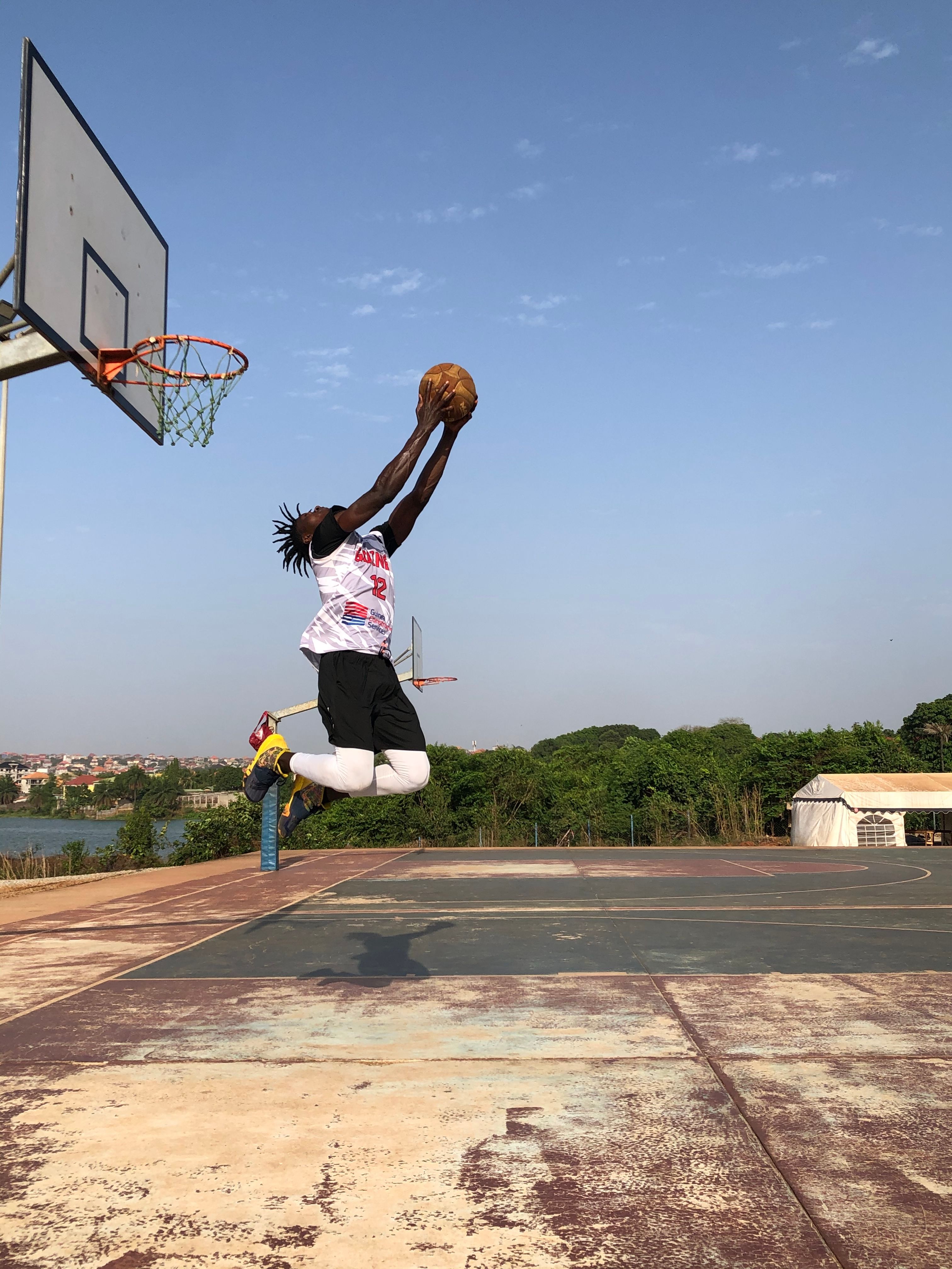 A Woman Shooting a Ball · Free Stock Photo