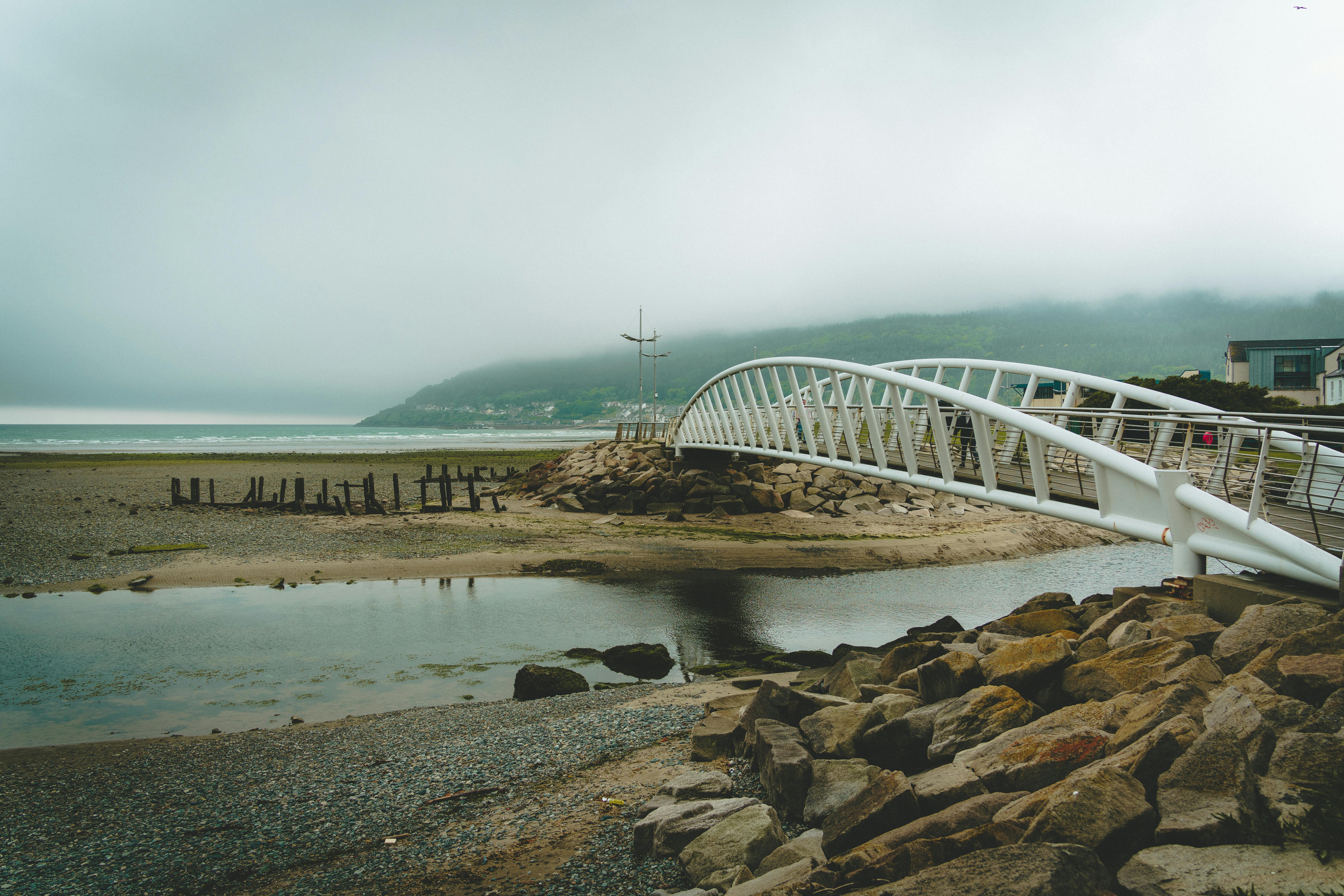 White Bridge over River near Sea · Free Stock Photo