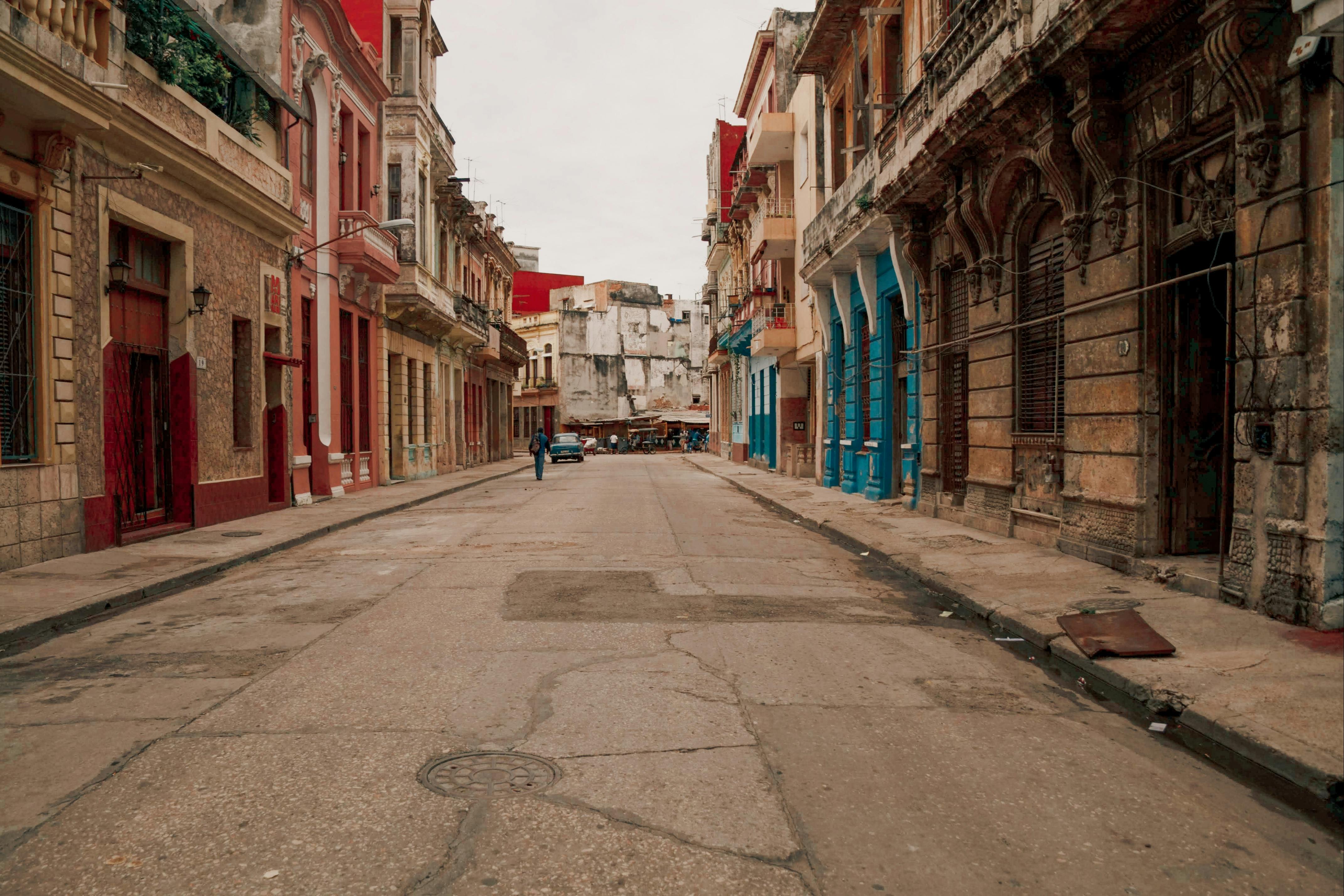 Old town street with low rise buildings · Free Stock Photo