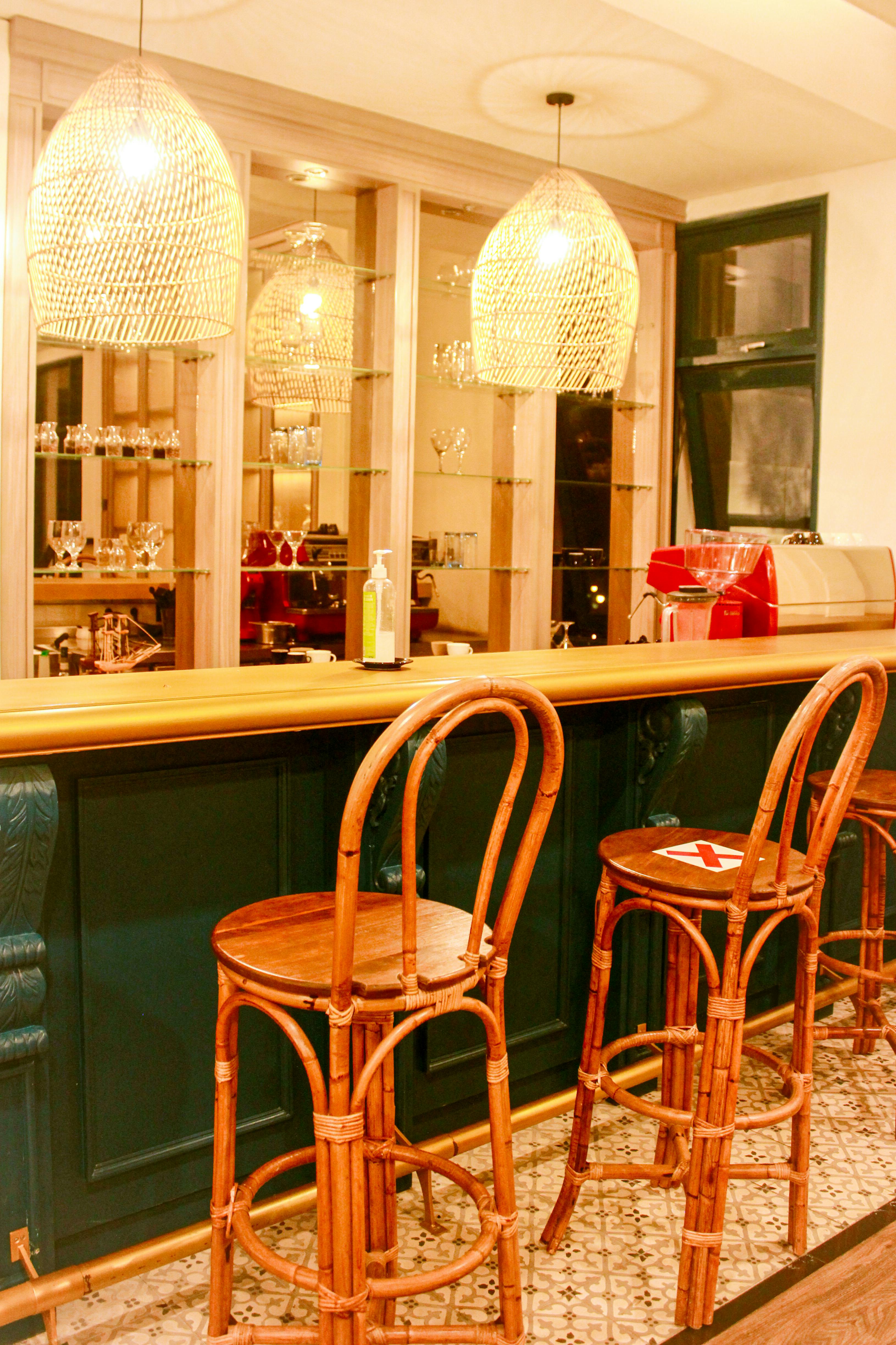 Brown Wooden Chairs Near the Bar Counter · Free Stock Photo