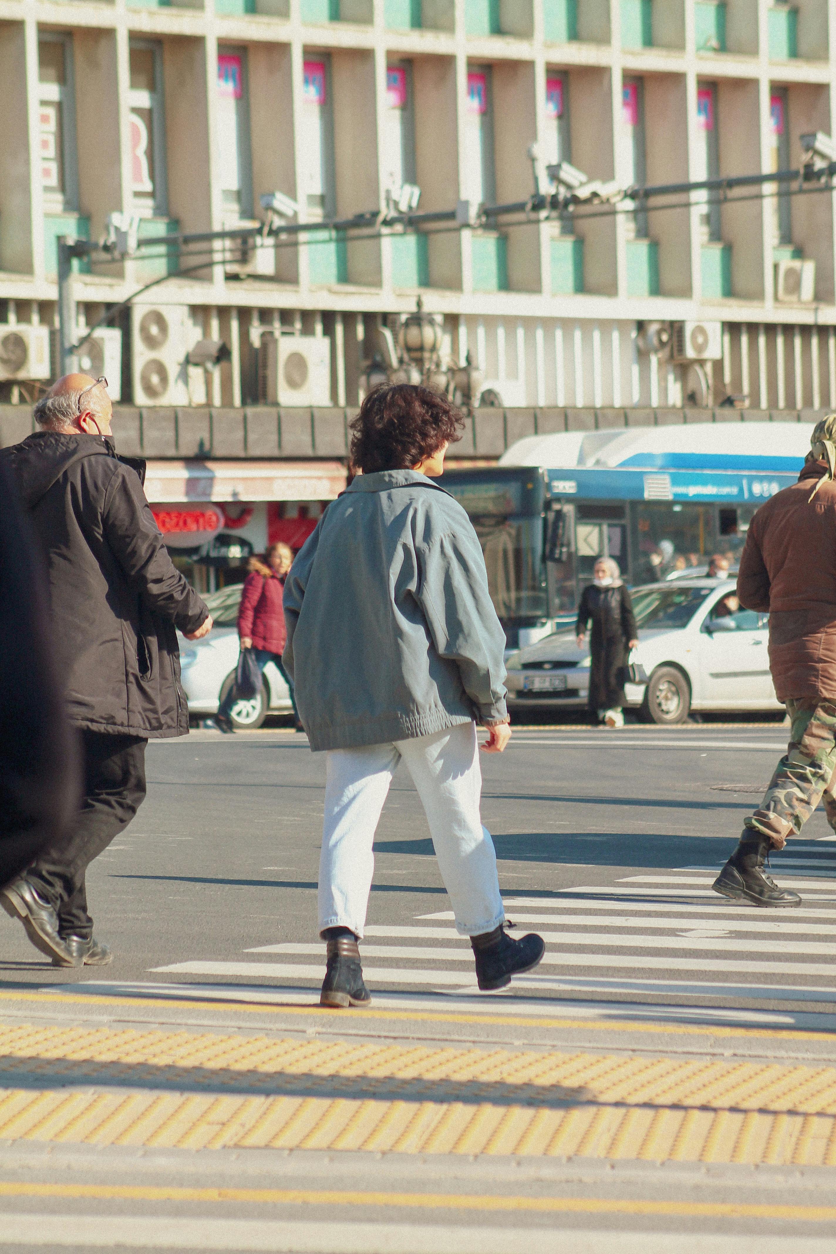 People Walking on Pedestrian Lane · Free Stock Photo