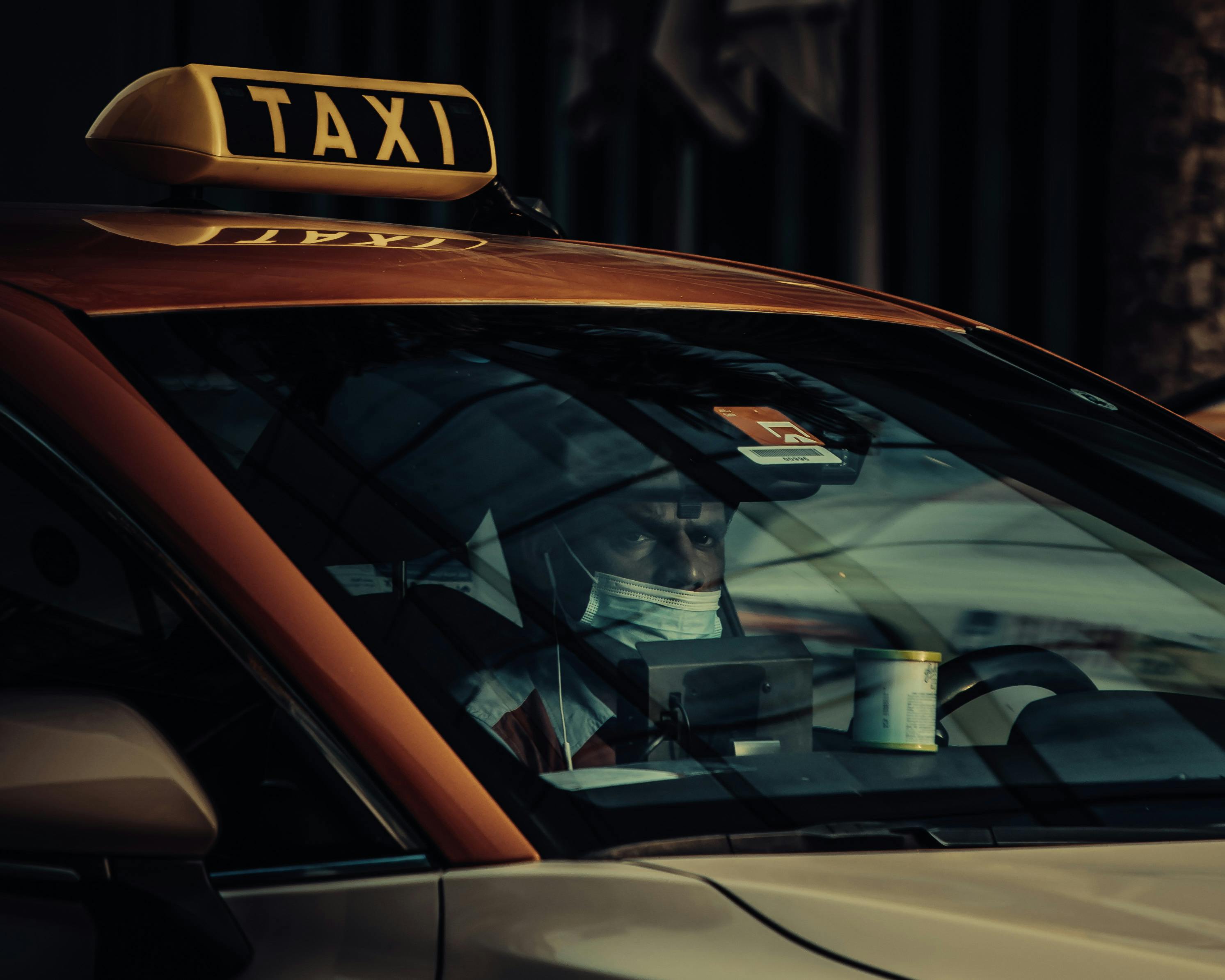Photo of a Taxi at Night Time · Free Stock Photo