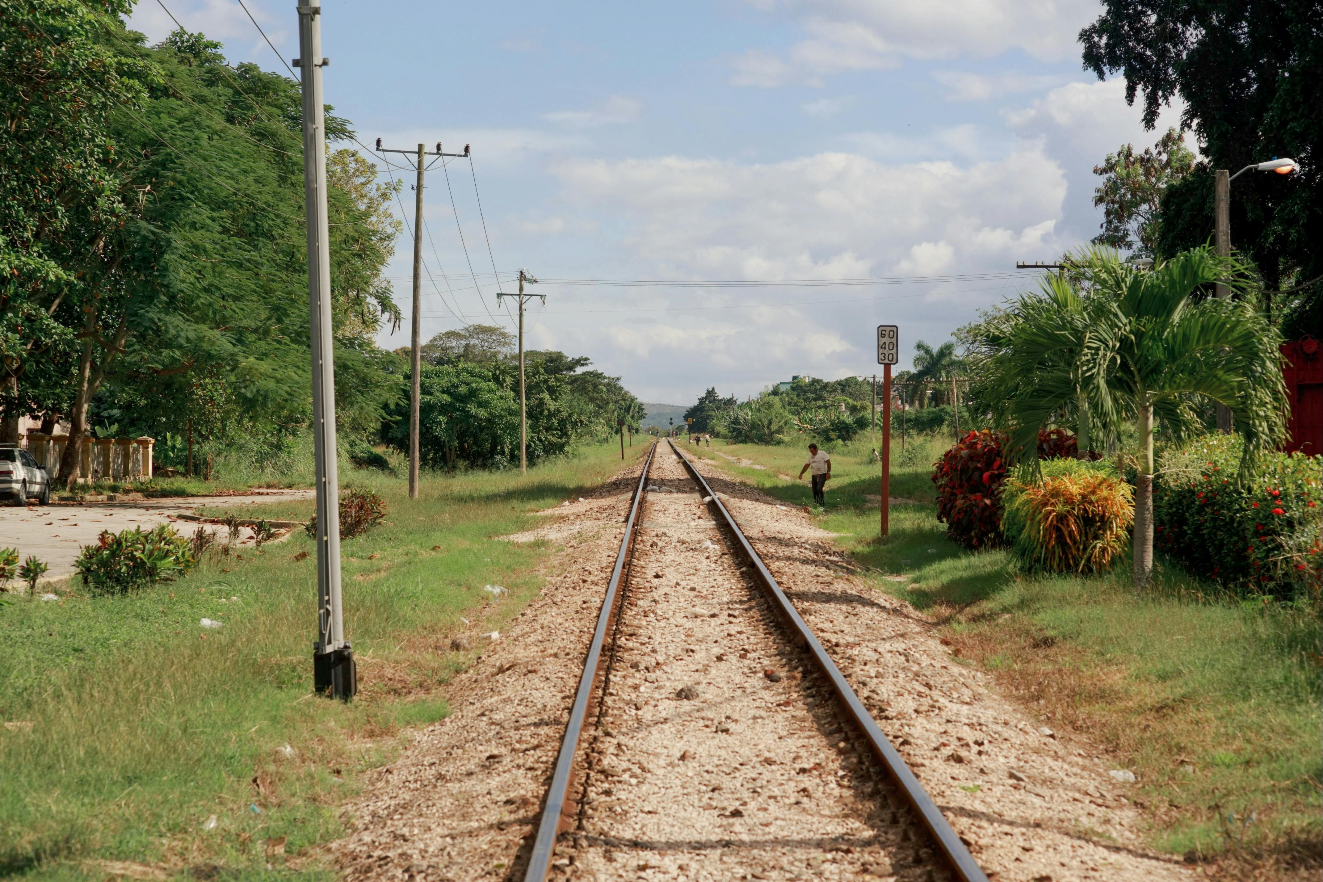 Brown Train Rail on Close Up Photo during Daytime · Free Stock Photo