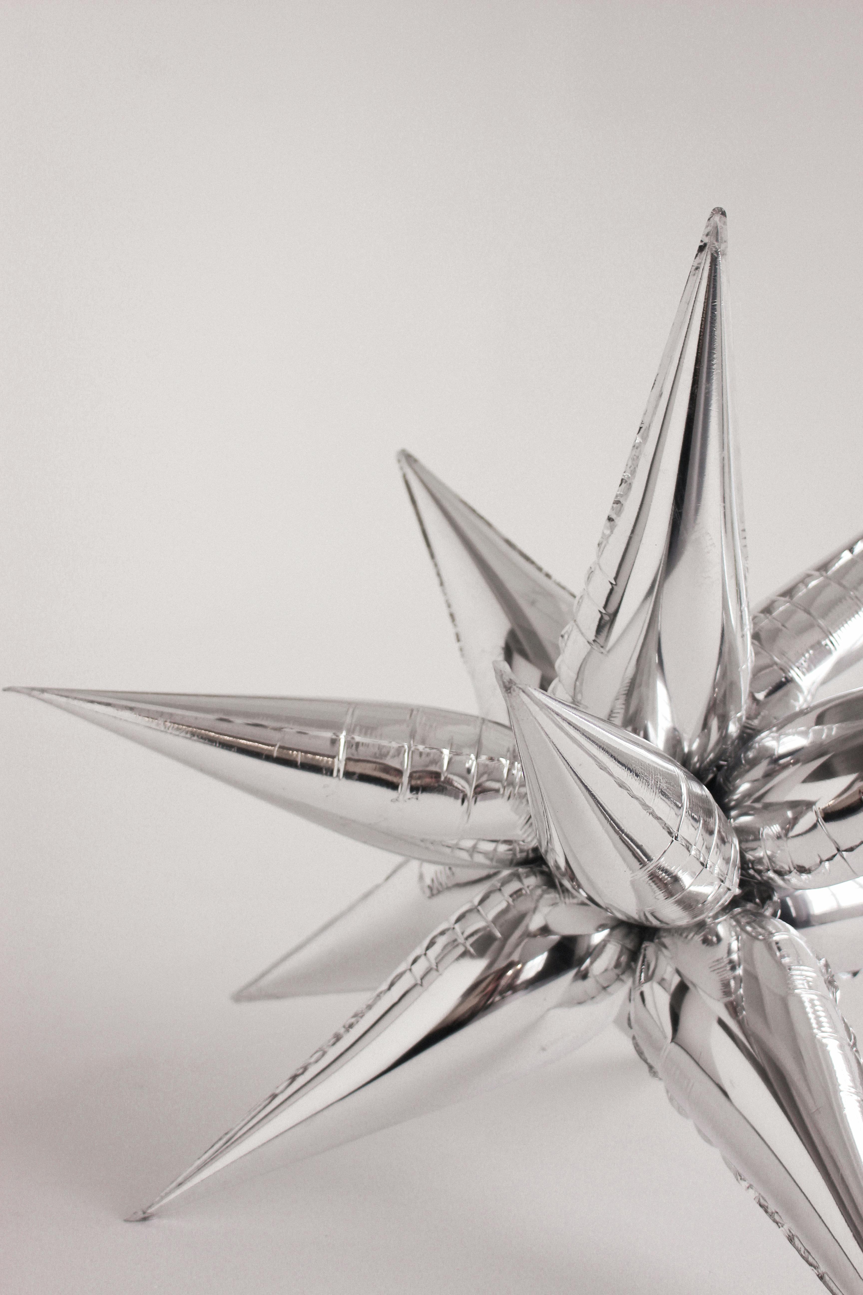 Silver Air Balloon on White Surface · Free Stock Photo