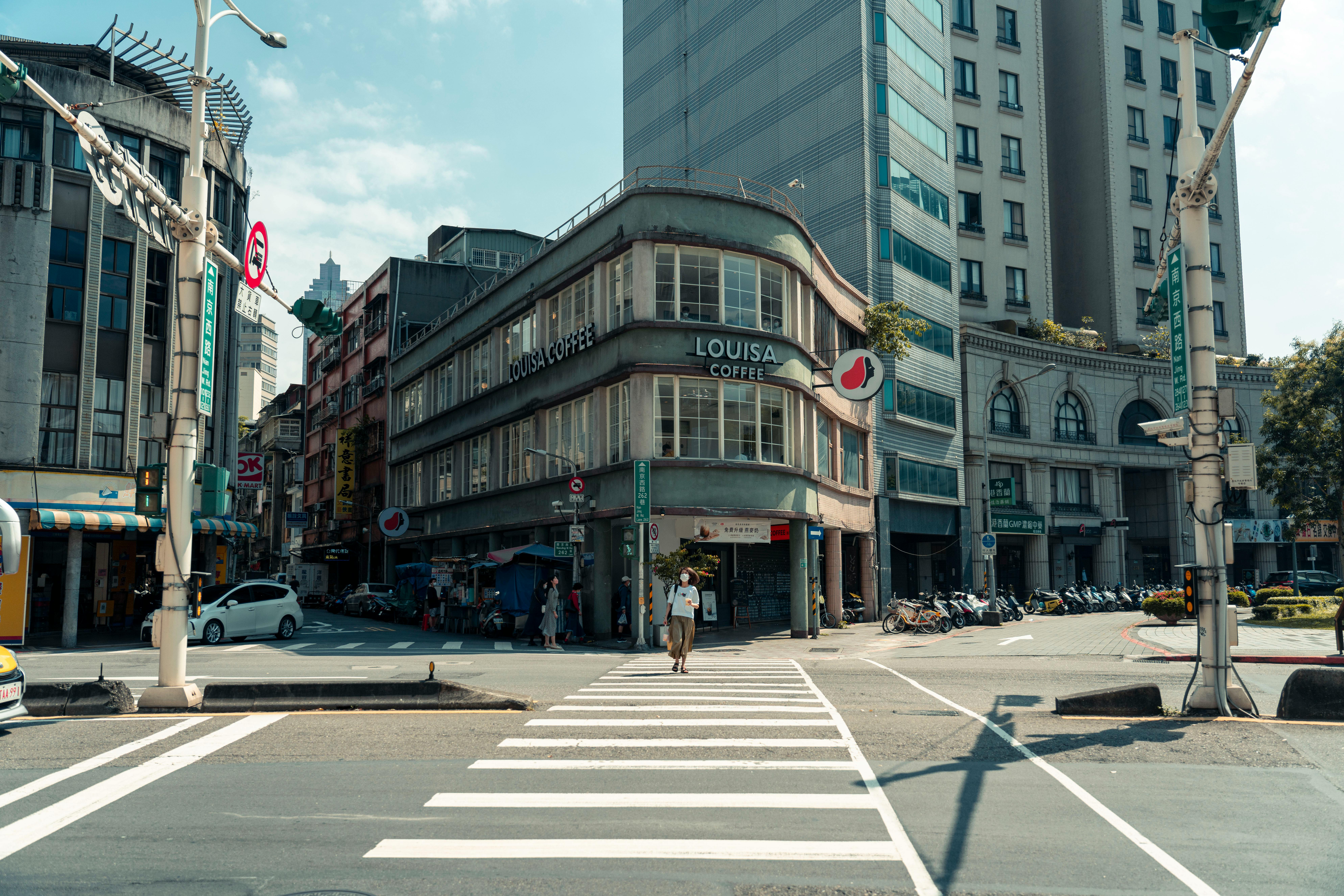 Person crossing the Street in a City · Free Stock Photo