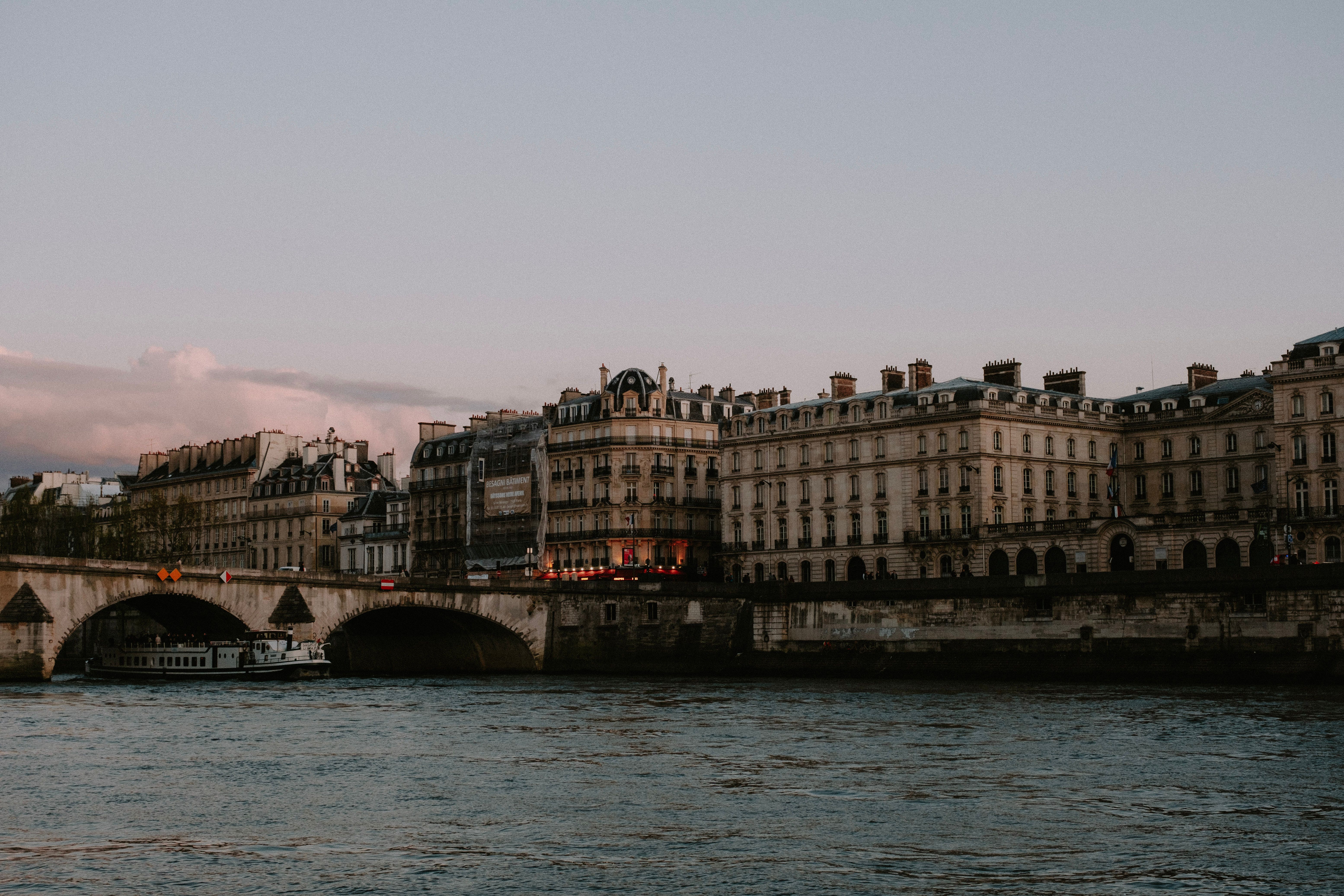 Buildings and Bridge over River · Free Stock Photo