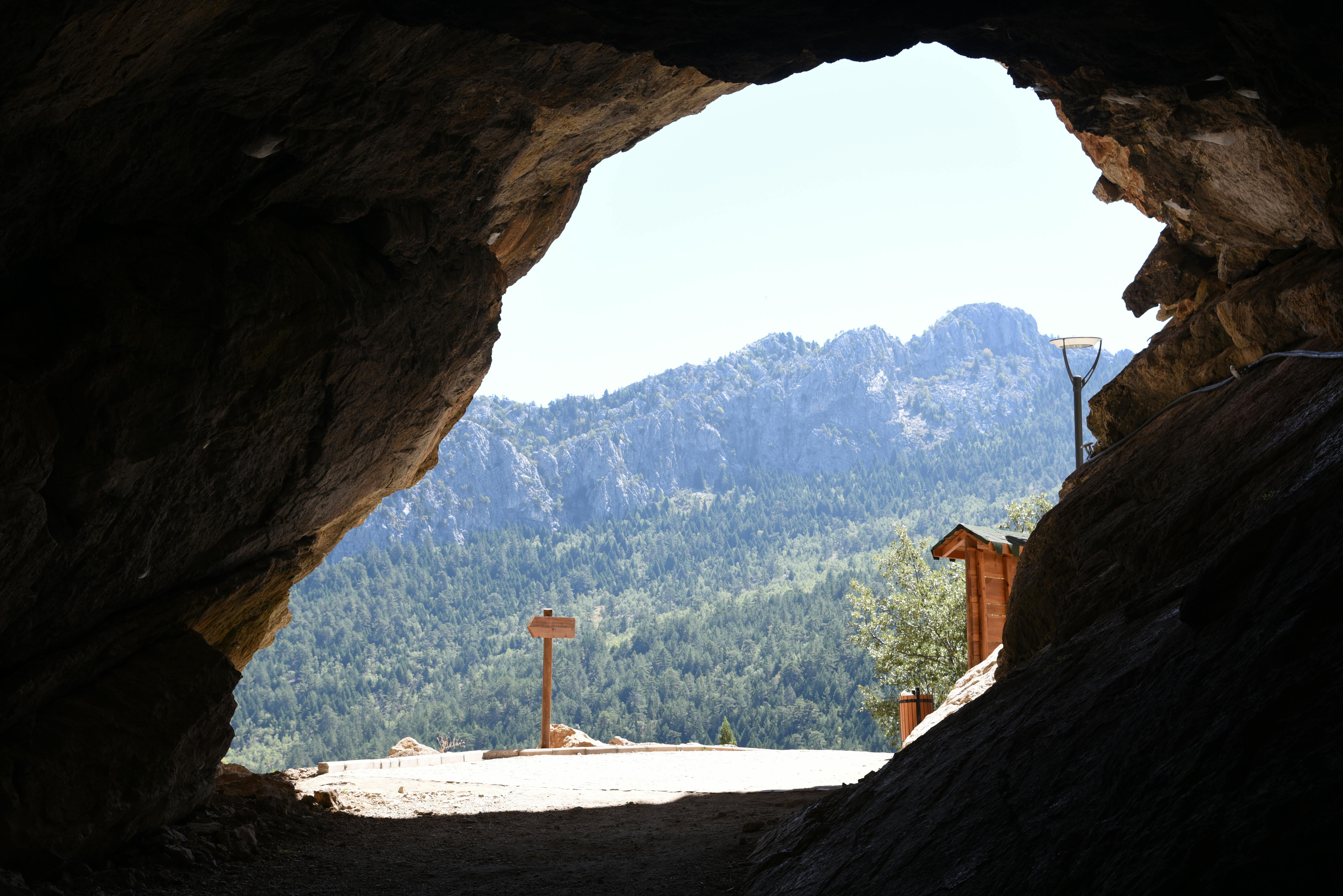 View of Green Mountains from a Cave Opening · Free Stock Photo