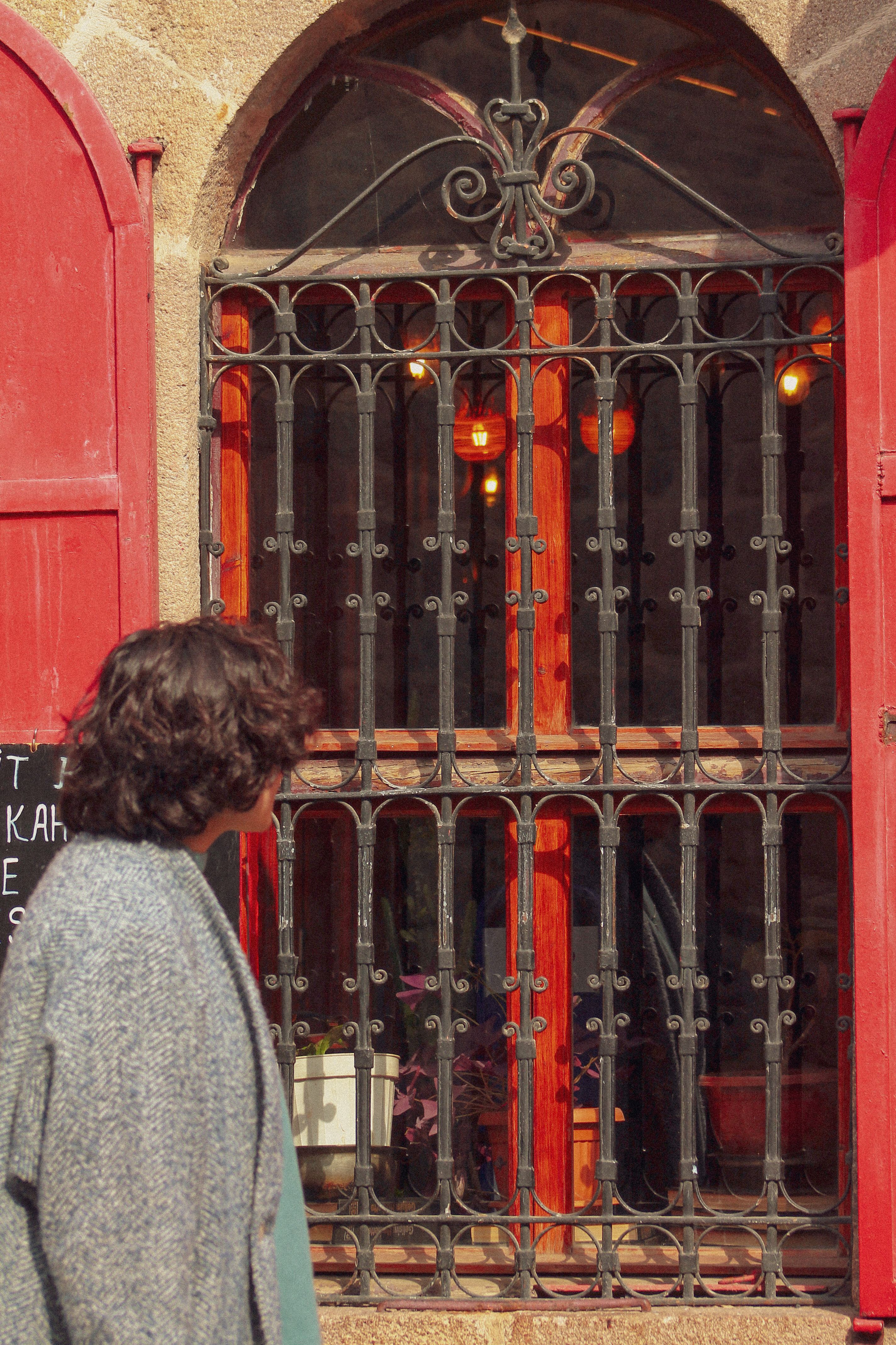 Man Standing in front of a Window · Free Stock Photo