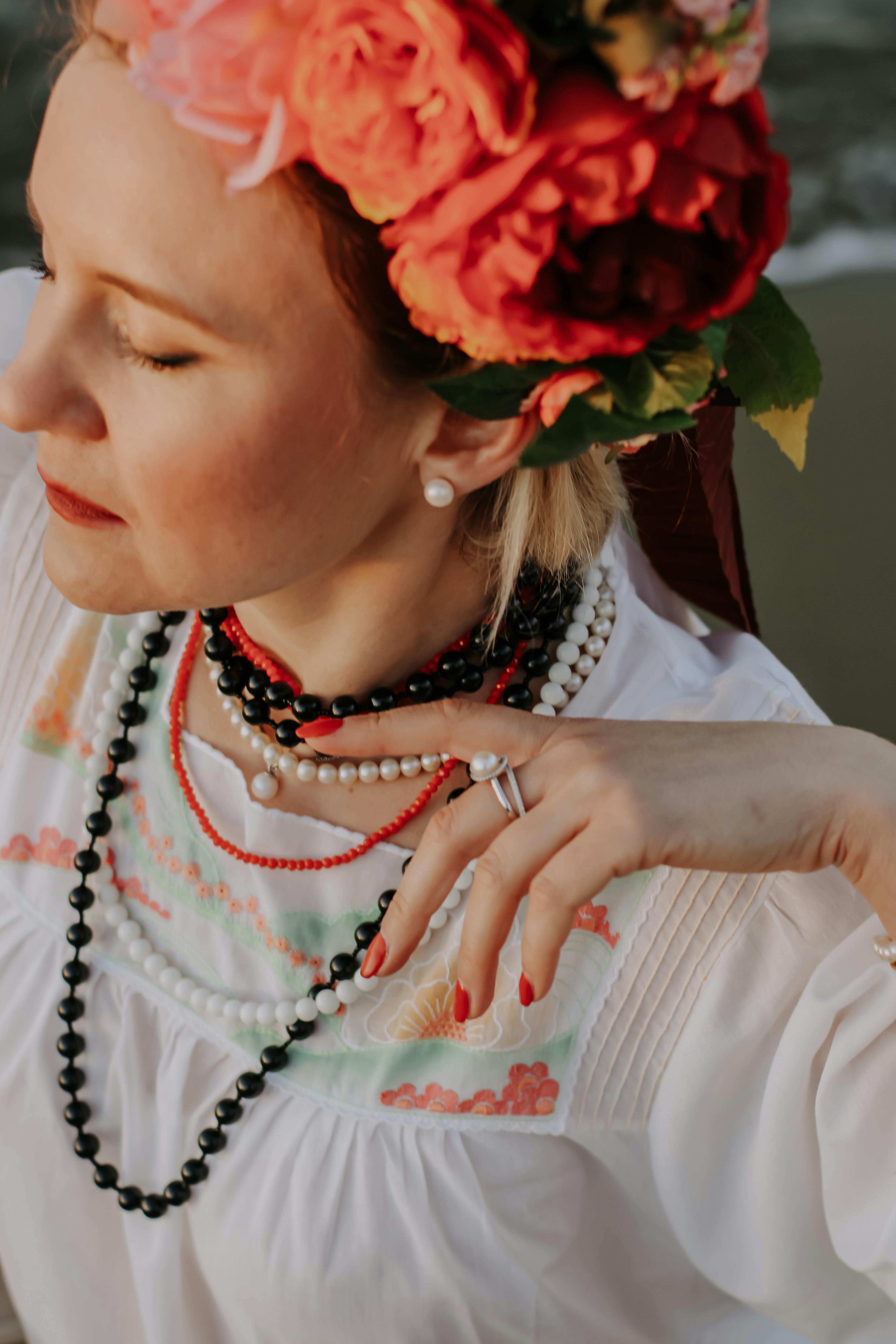 White Pearl Necklace on Table · Free Stock Photo