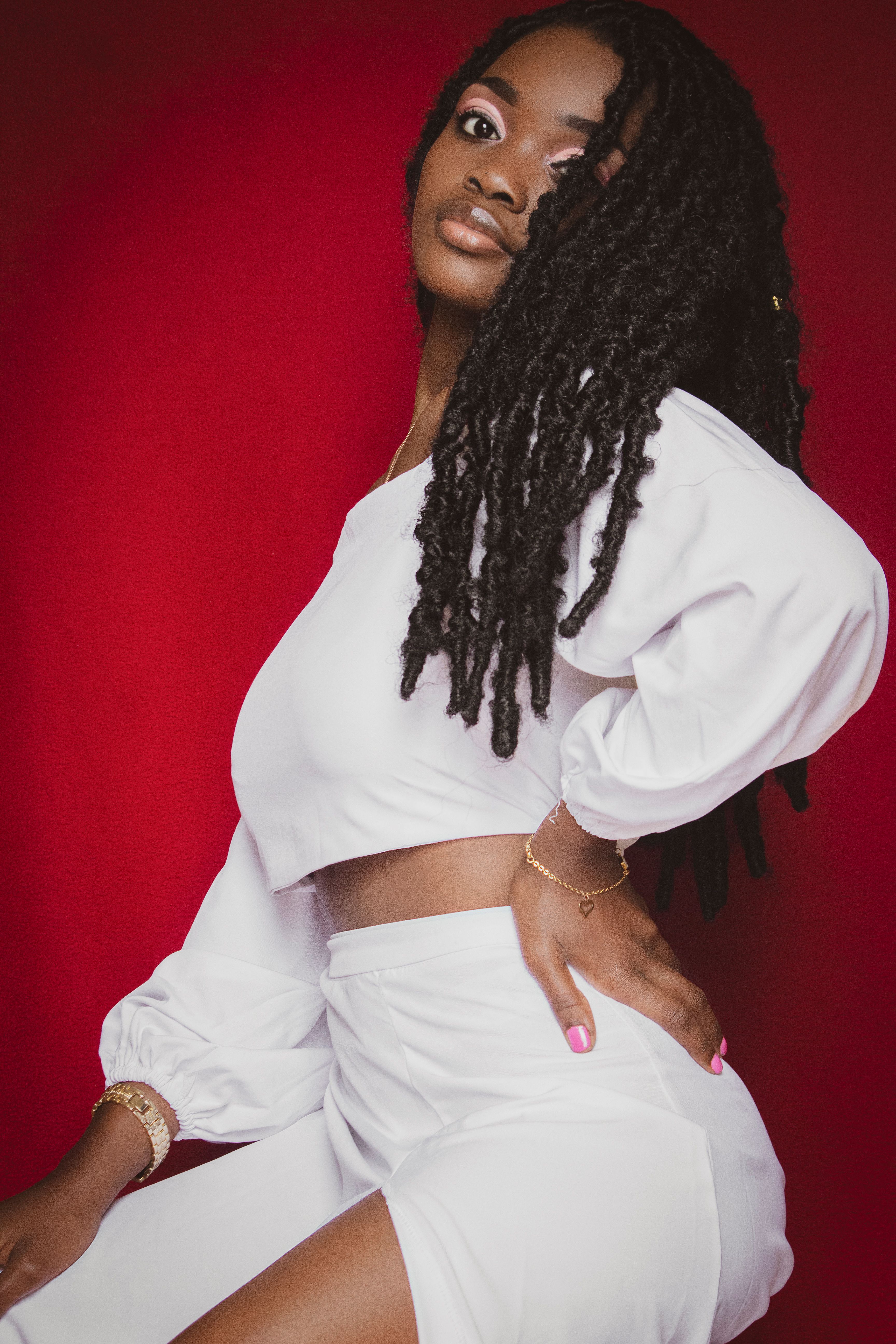 Person in White Clothing Doing a Pose · Free Stock Photo