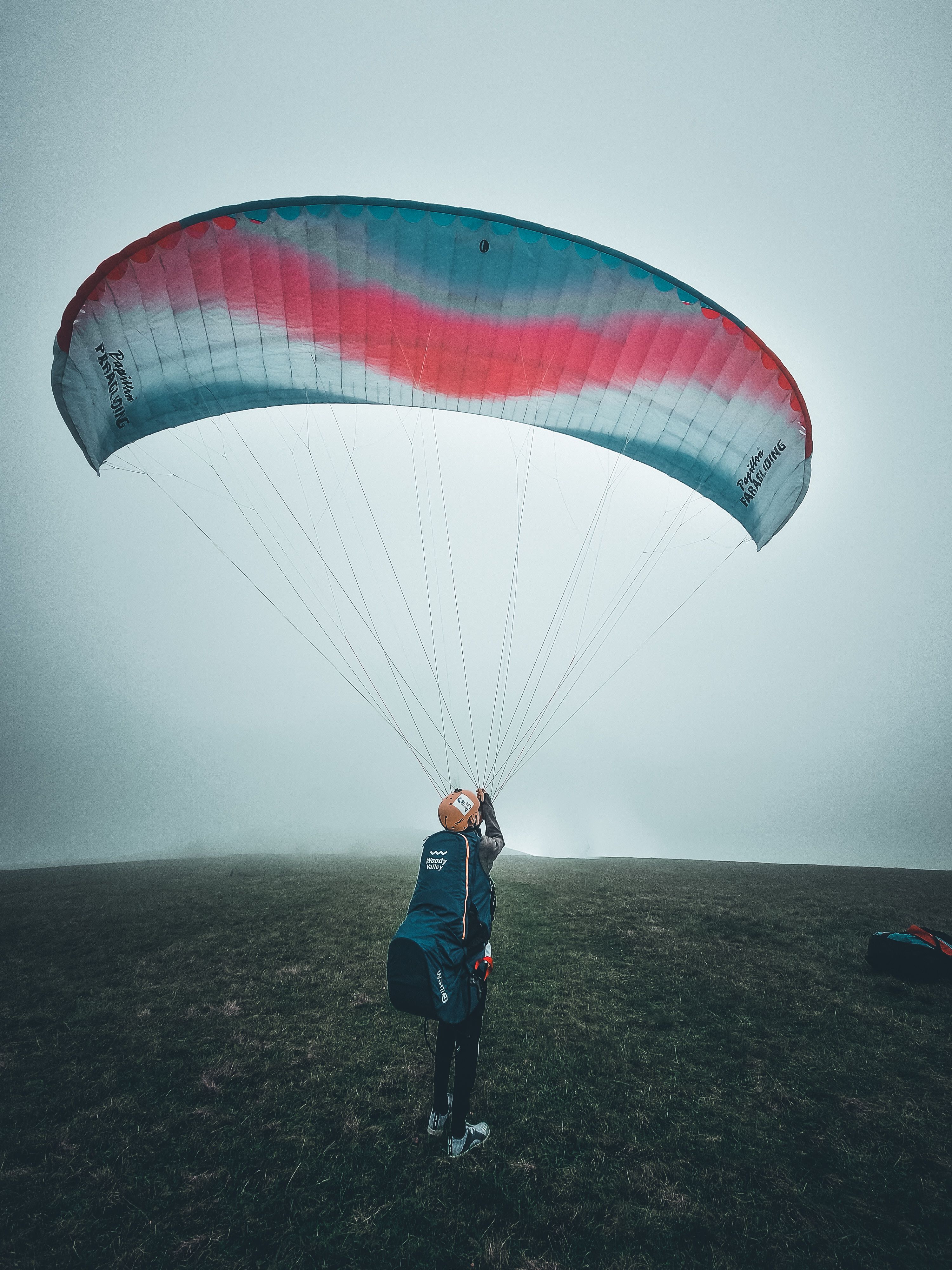 Person Standing with Parachute · Free Stock Photo